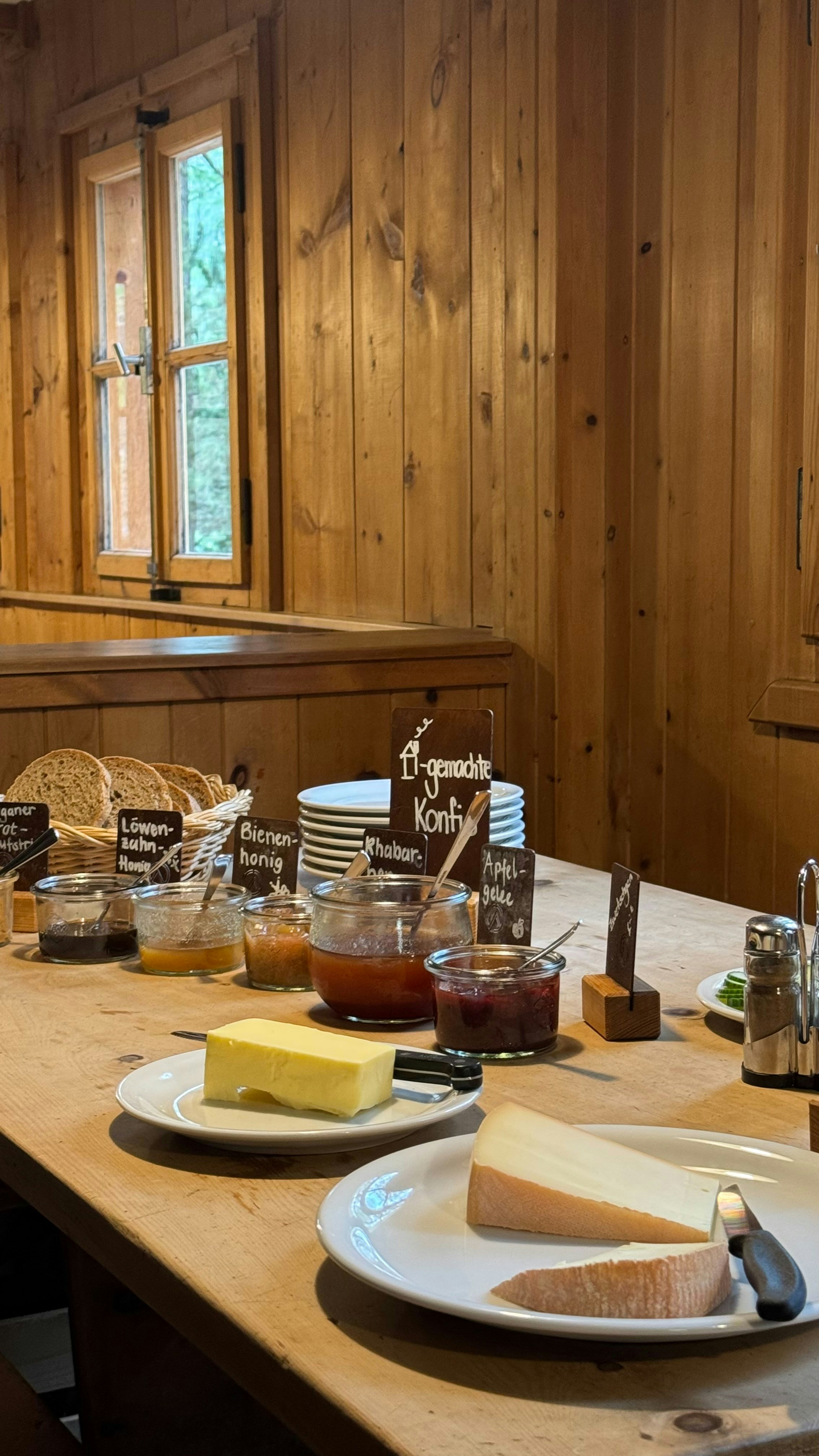 Cheese and Jars on a Rustic Kitchen Counter