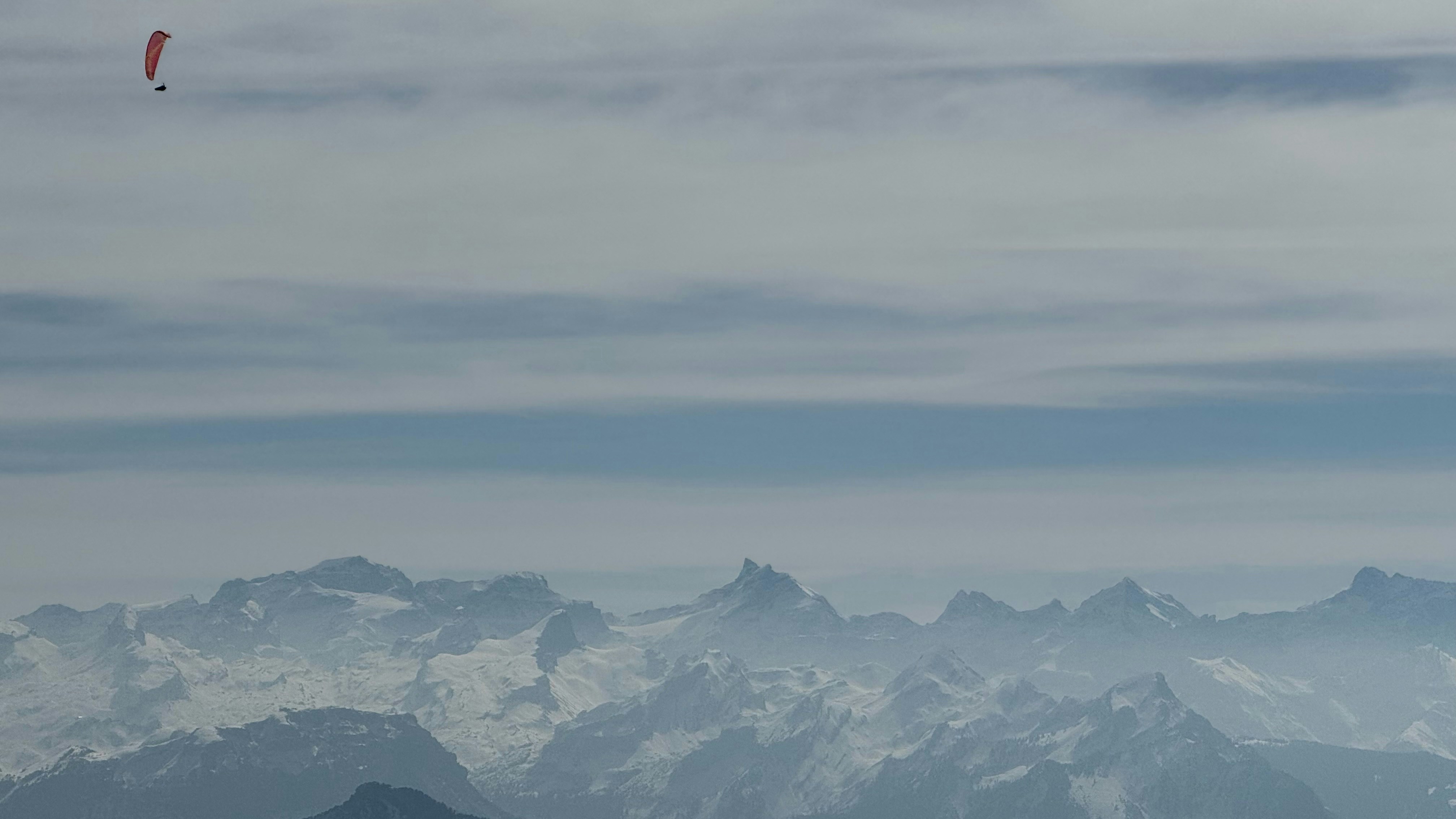 Azure Horizon: Snow-draped Peaks Under an Open Sky