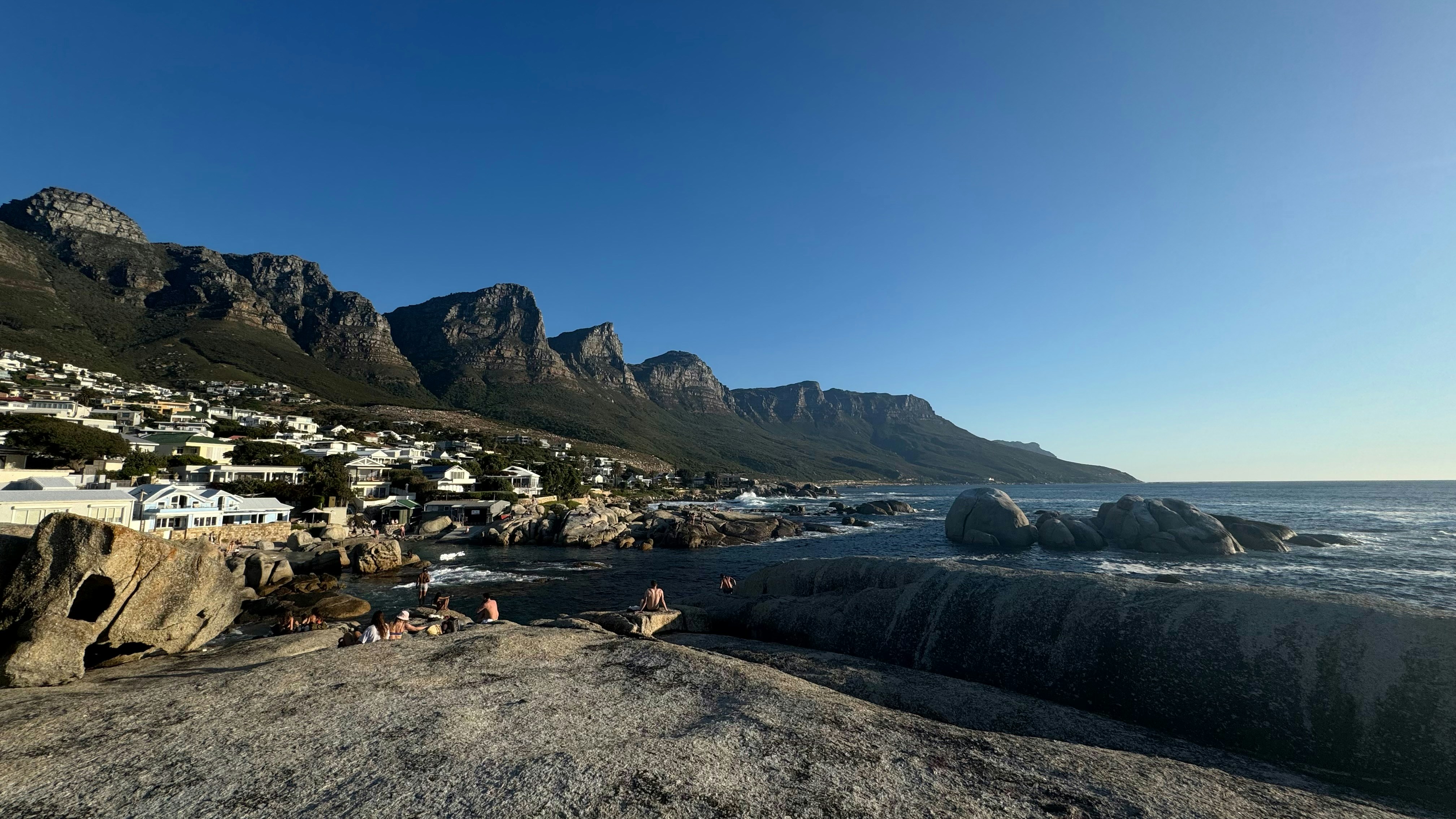 Coastal Village Meets Granite Breakers under a Brisk Cerulean Sky