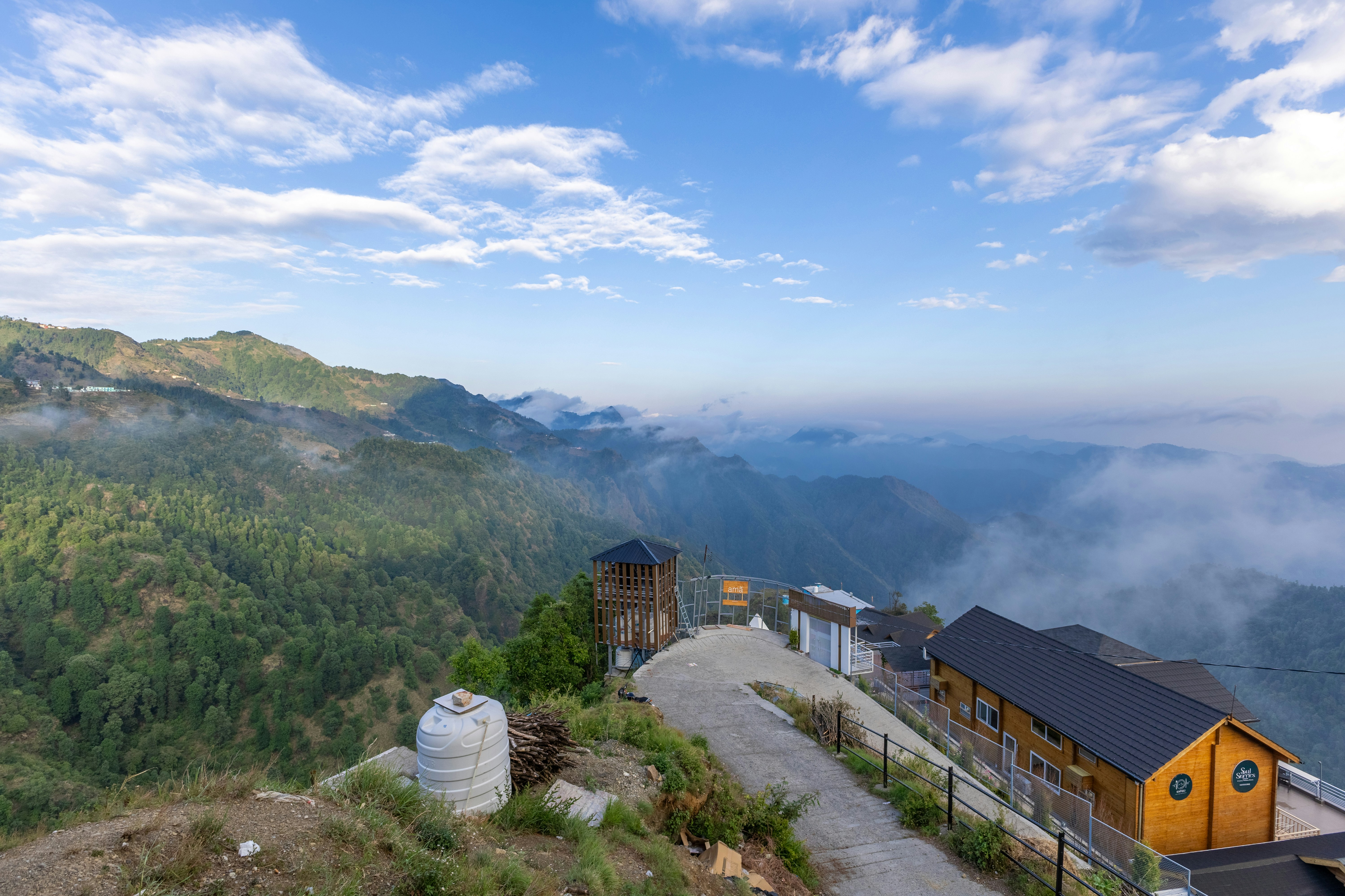 Clouded Ridgeside Café Overlooking a Sea of Fog
