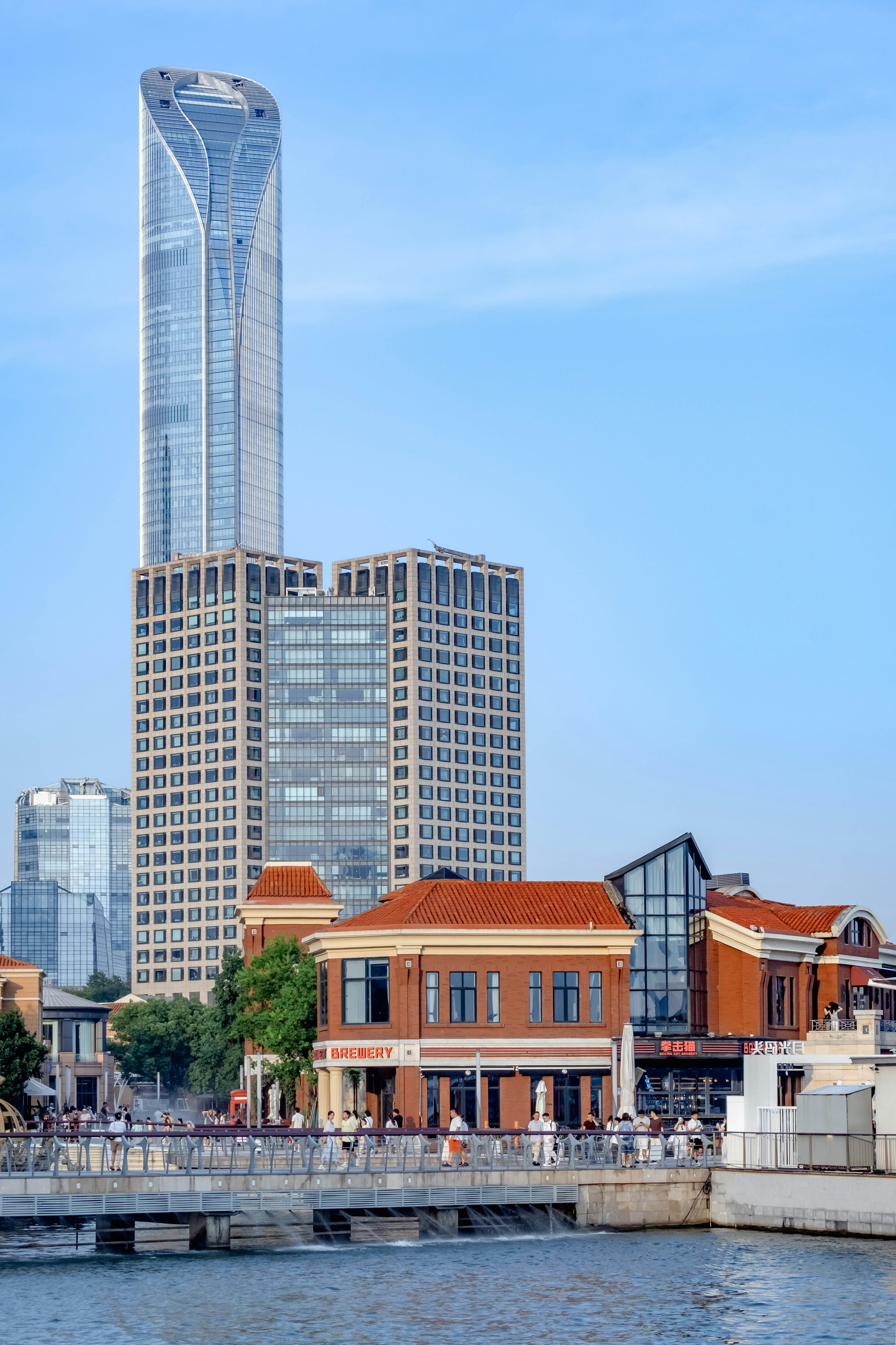 Skyline and riverside: a modern cityscape with a riverfront promenade