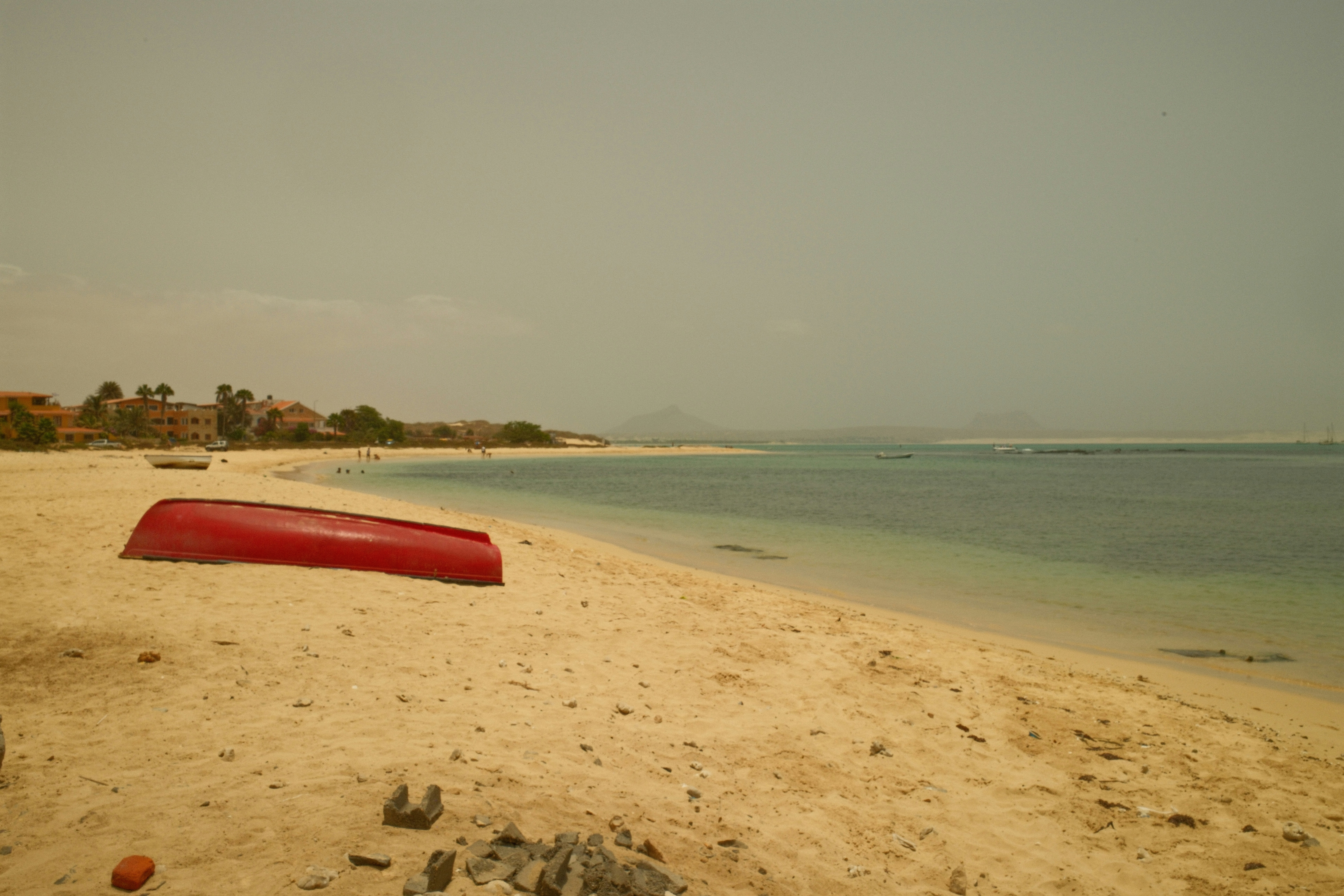 Red Boat on a Quiet Costa Beach