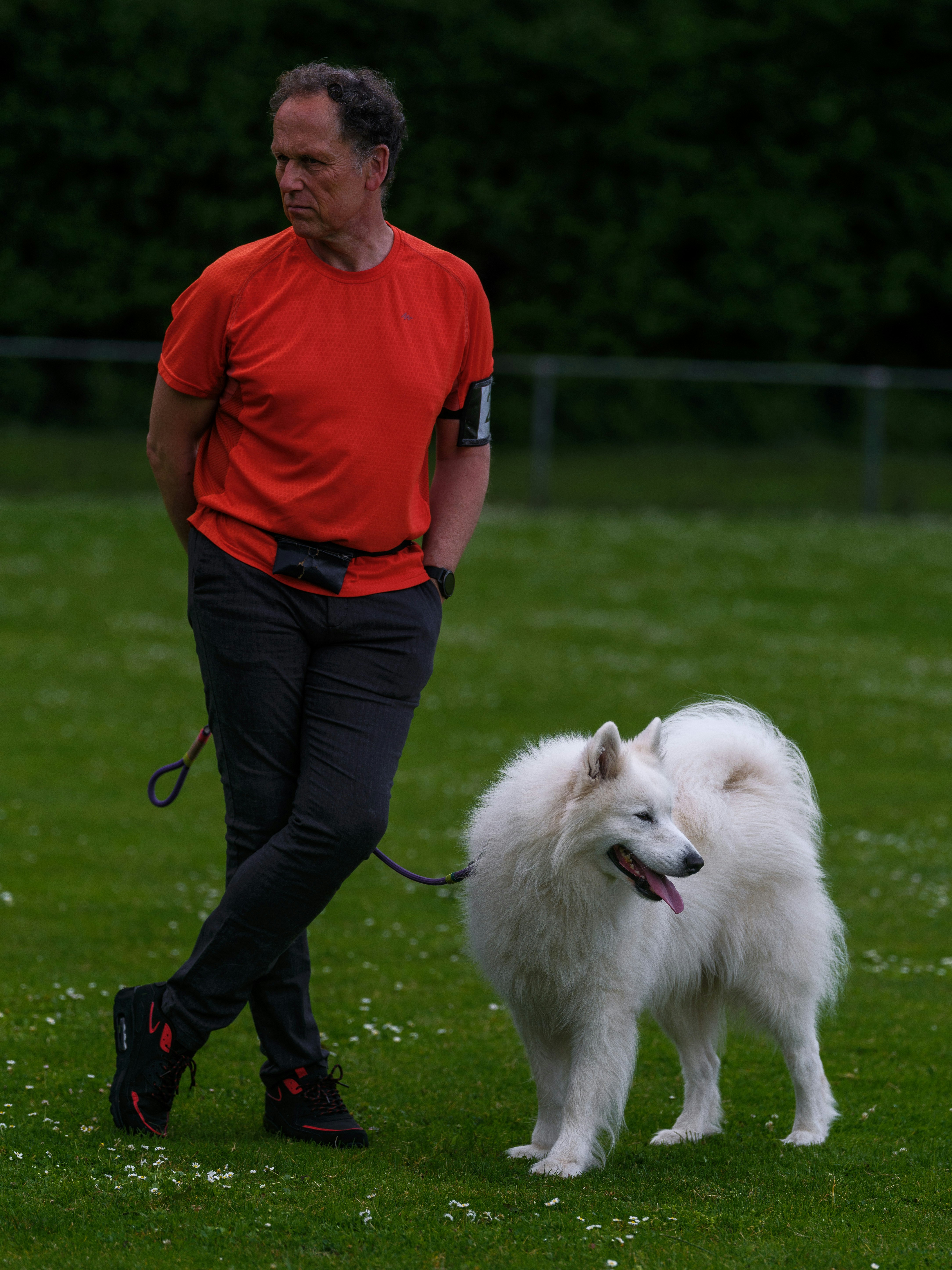 Coach and Canine in a Quiet Park Walk