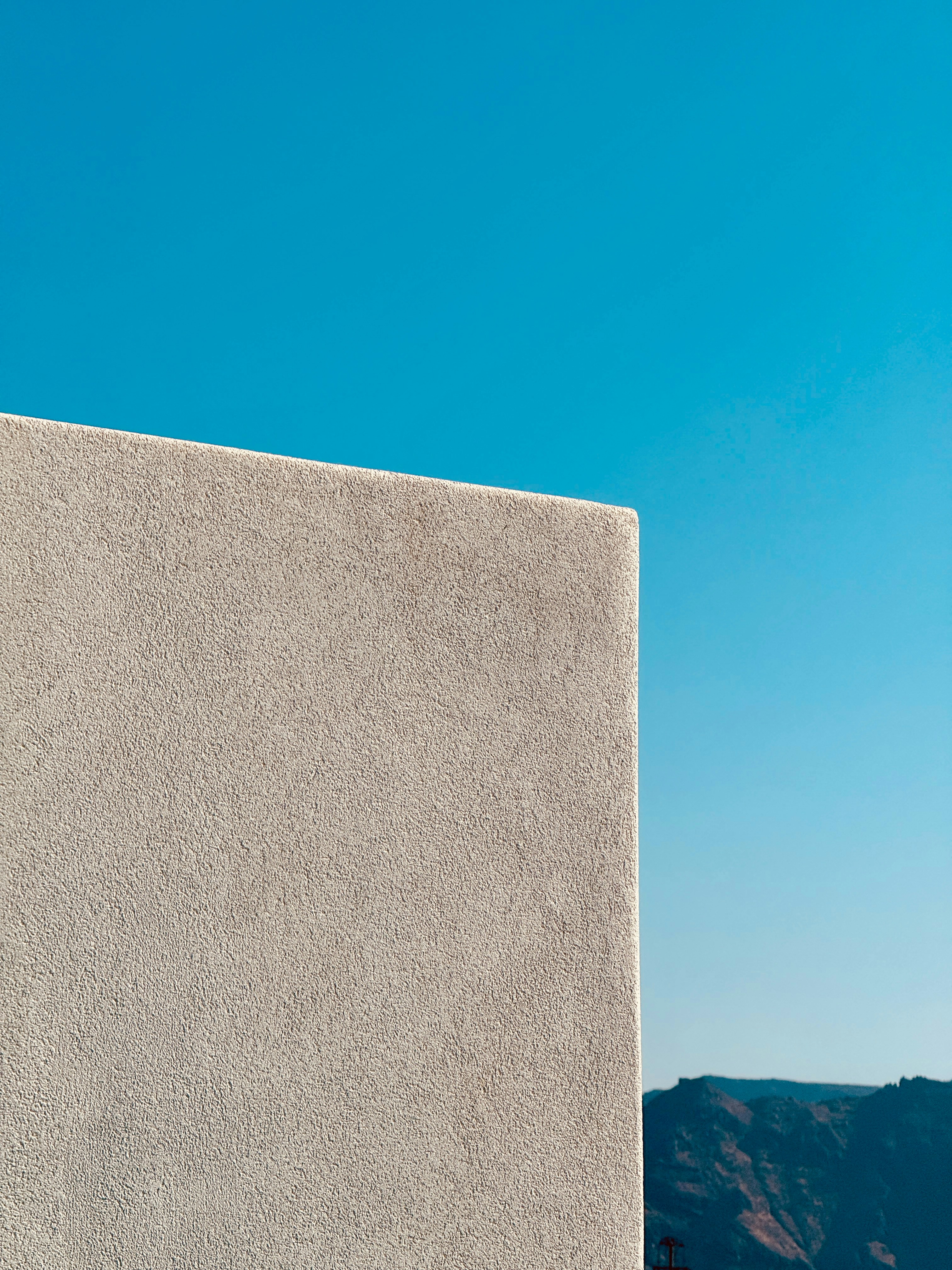 Edge of Calm: A Minimal Concrete Wall Against a Crisp Desert Sky