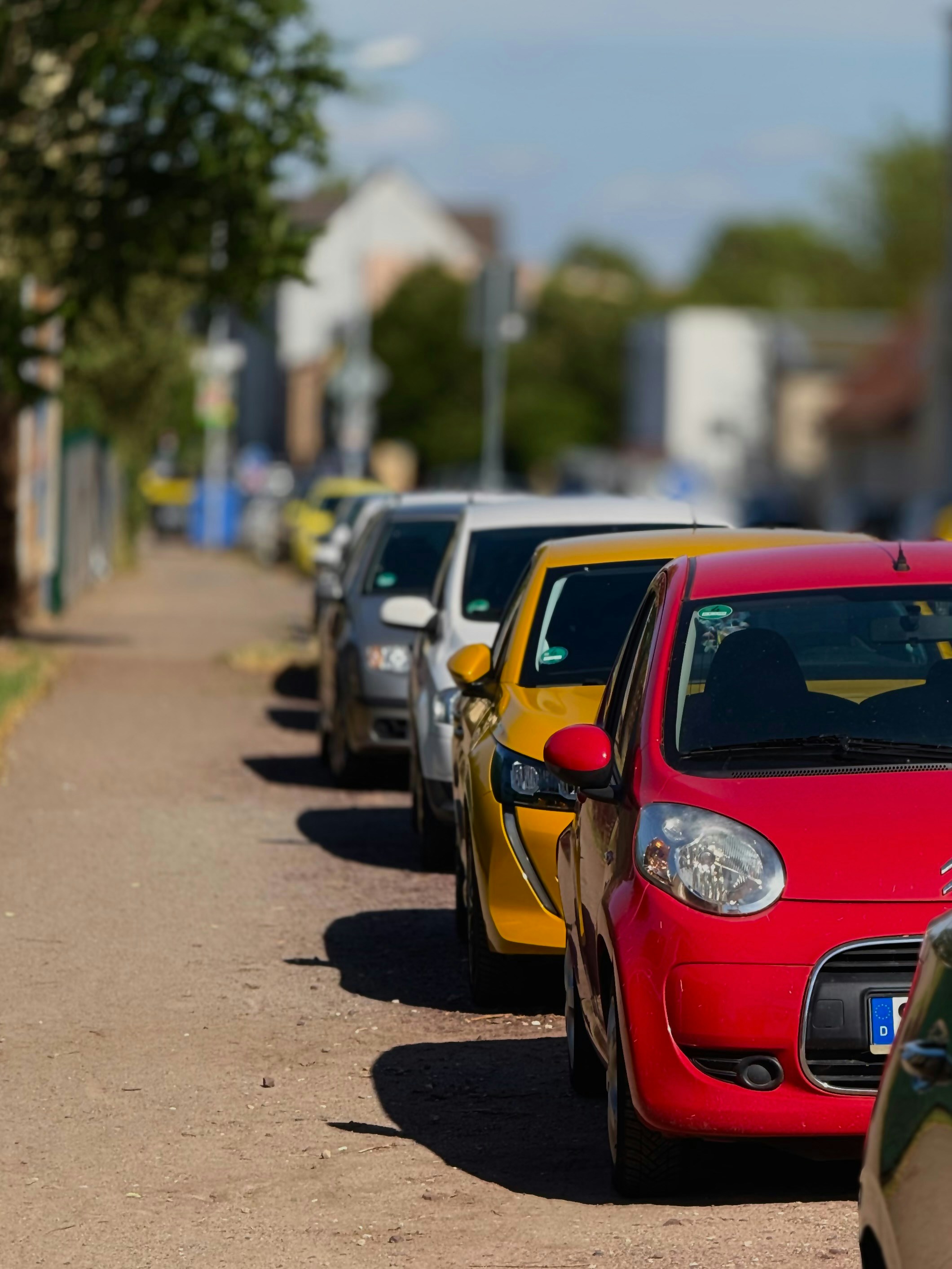 Cargo of Color: A Lines-of-Cars Street in Bloom