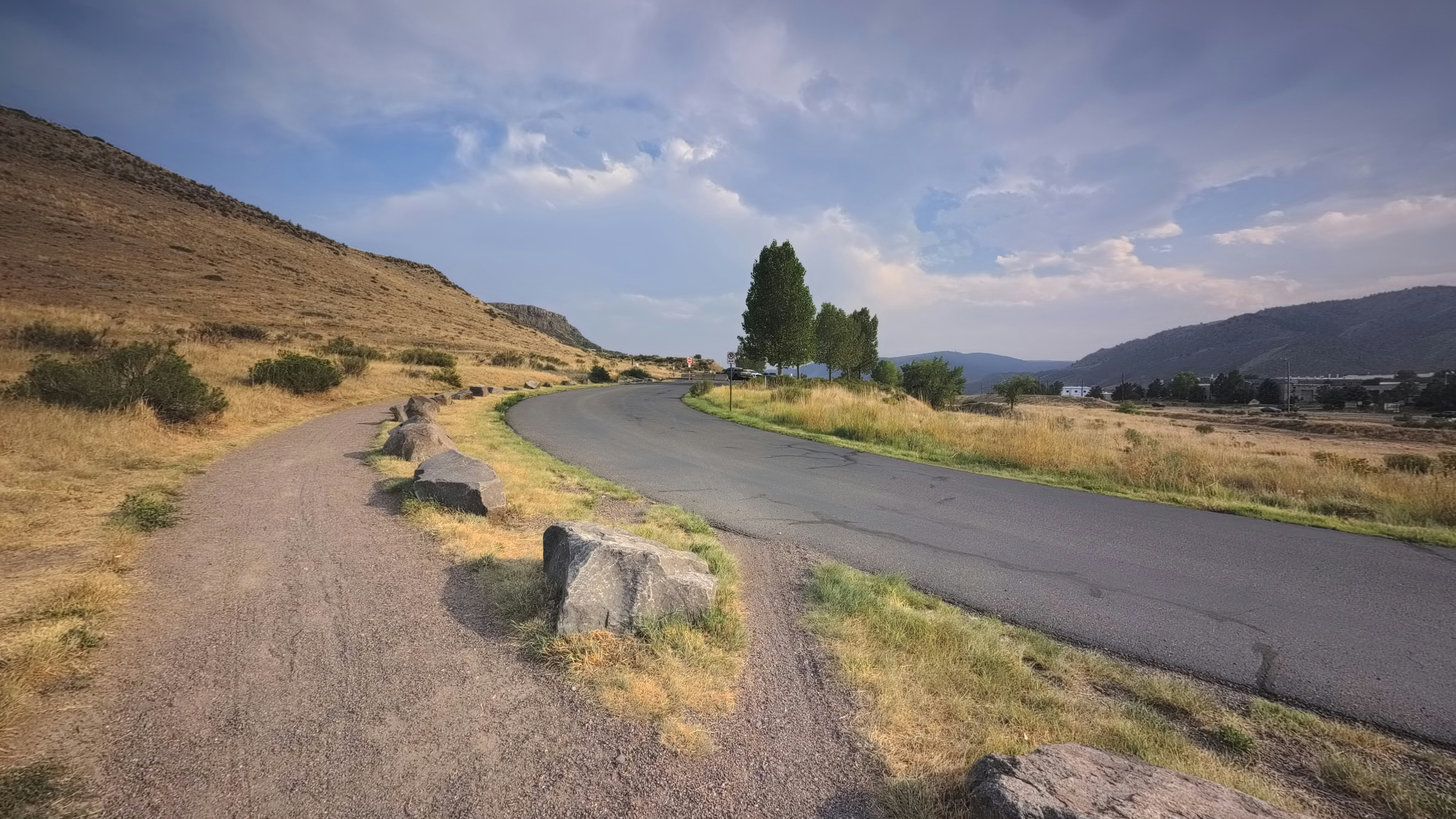 Desert Road Bend Under Open Sky