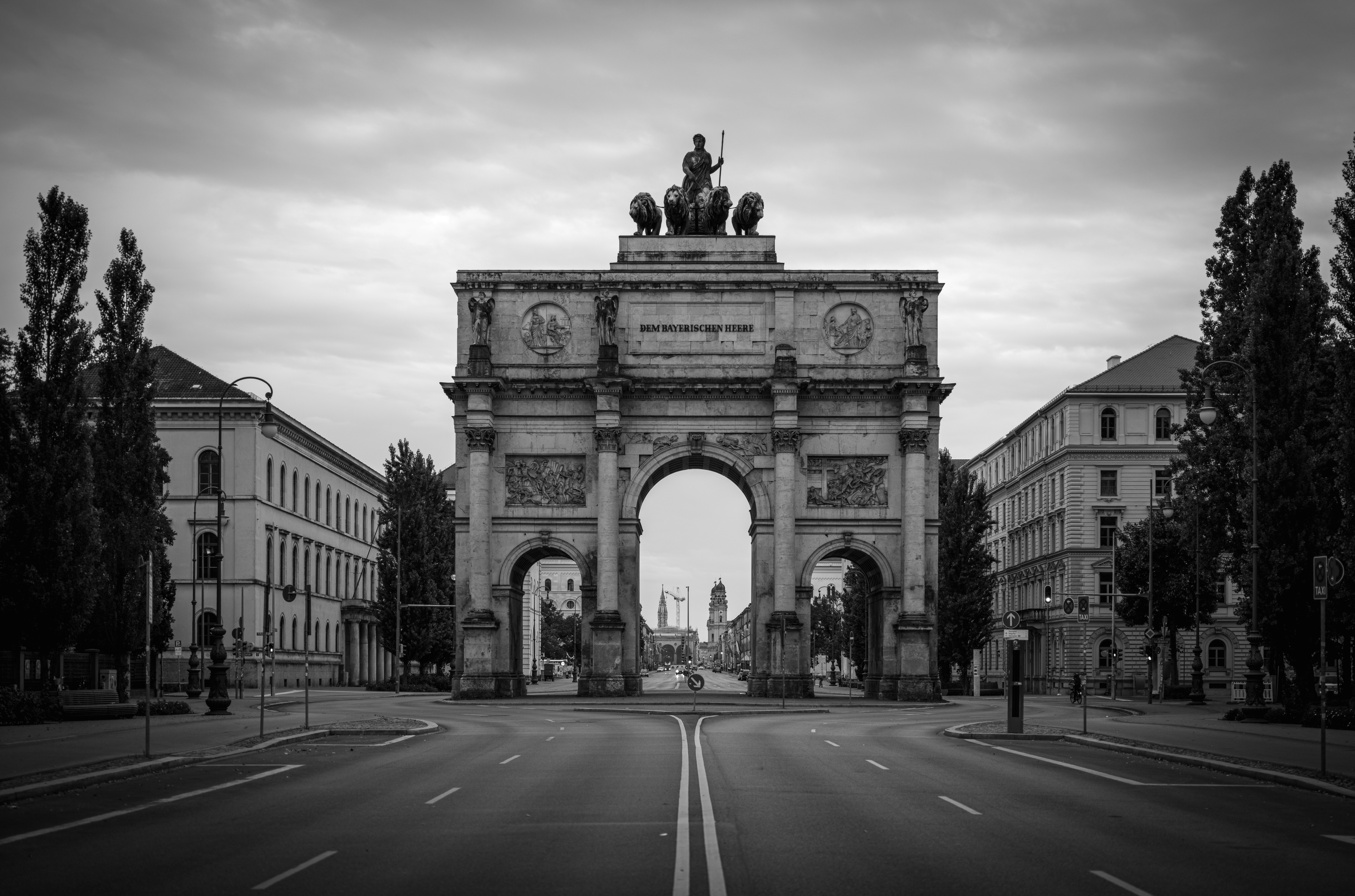 Archway of Triumph: A Quiet Boulevard Snapshot
