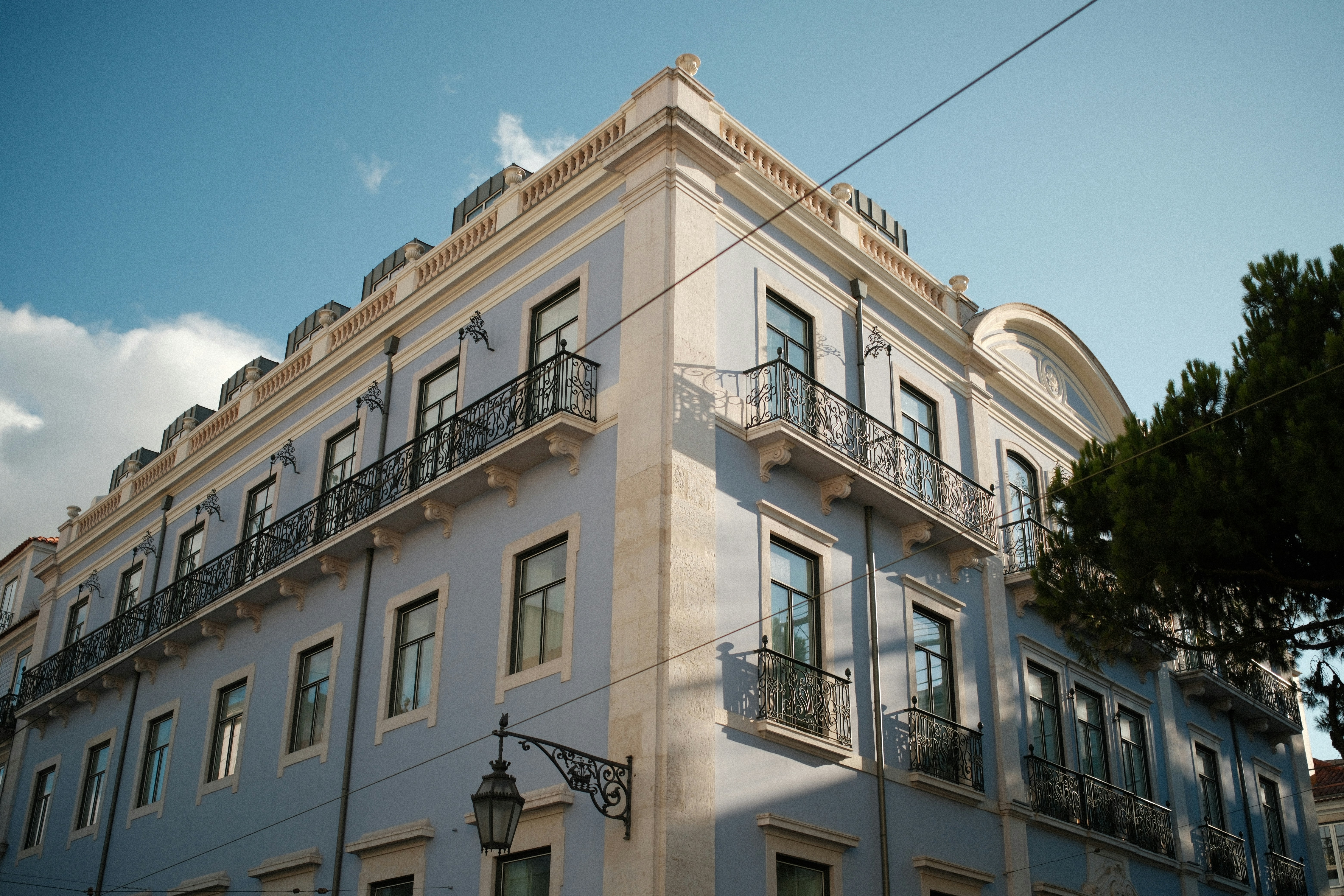 Corner Facades on a Sunlit Blue Building