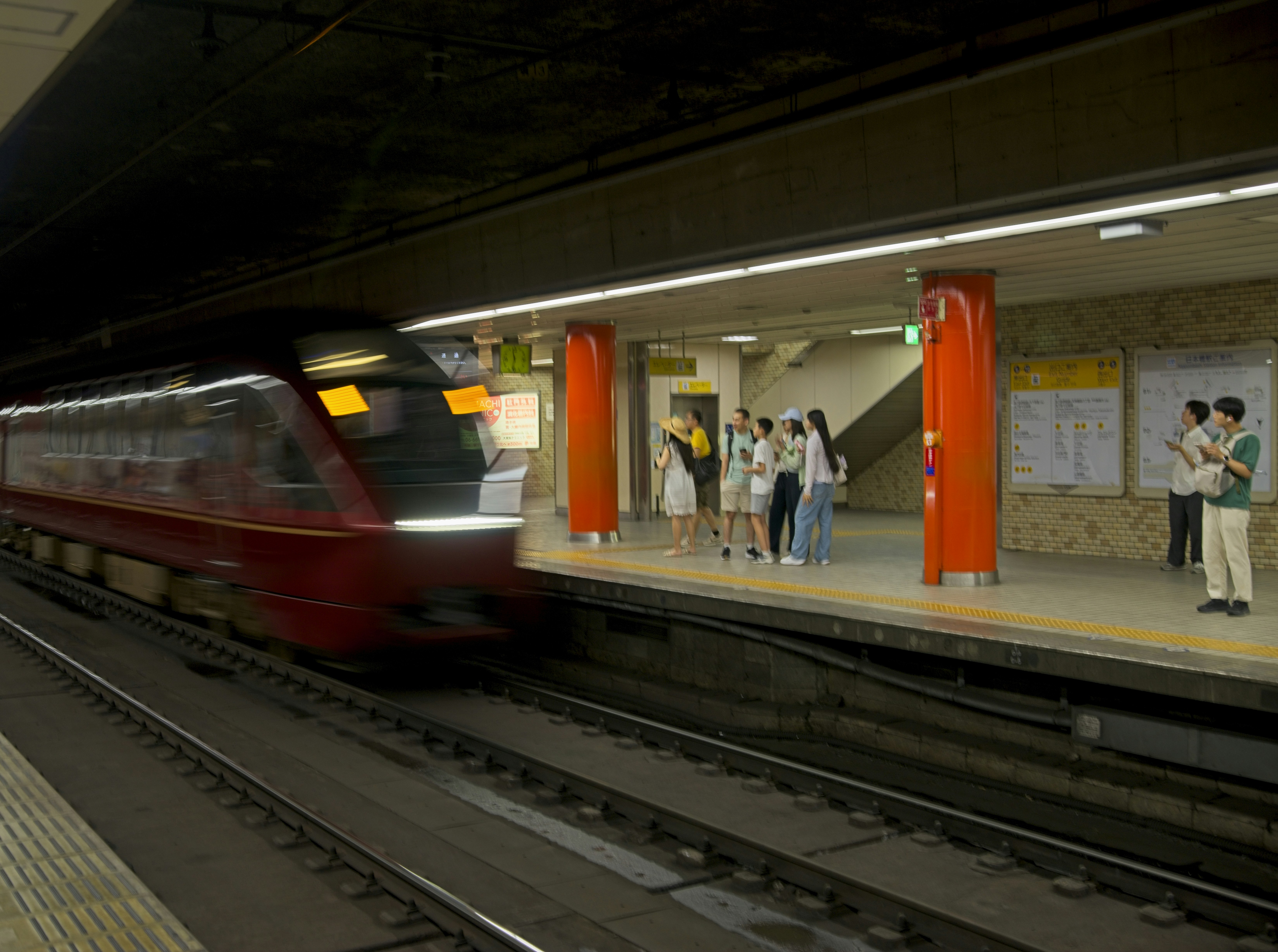 Tunnel of Commuters: A Blurred Train Rushes Past a Quiet Platform