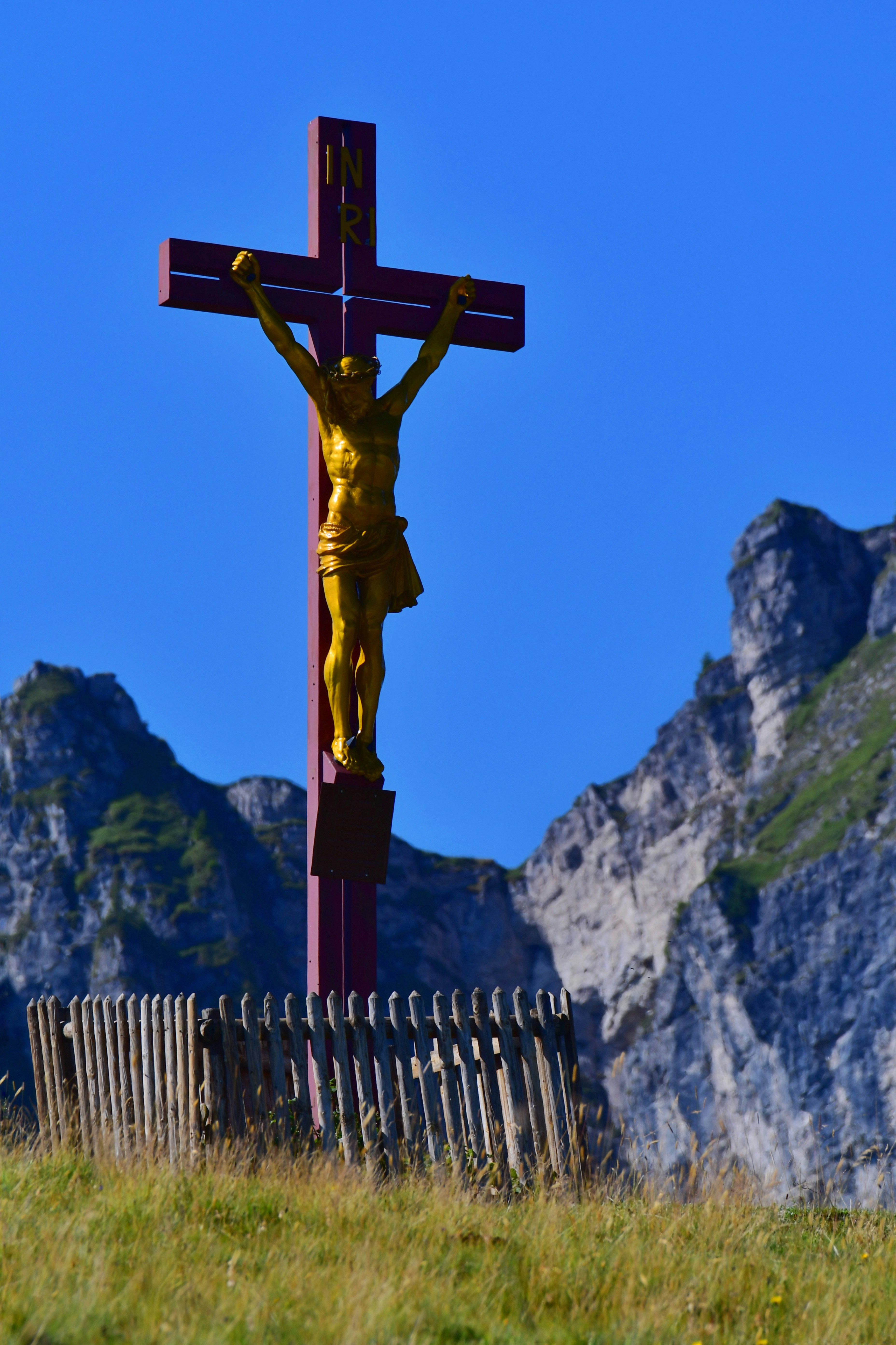 Cruciform Summit: Golden Christ at Alpine Crest