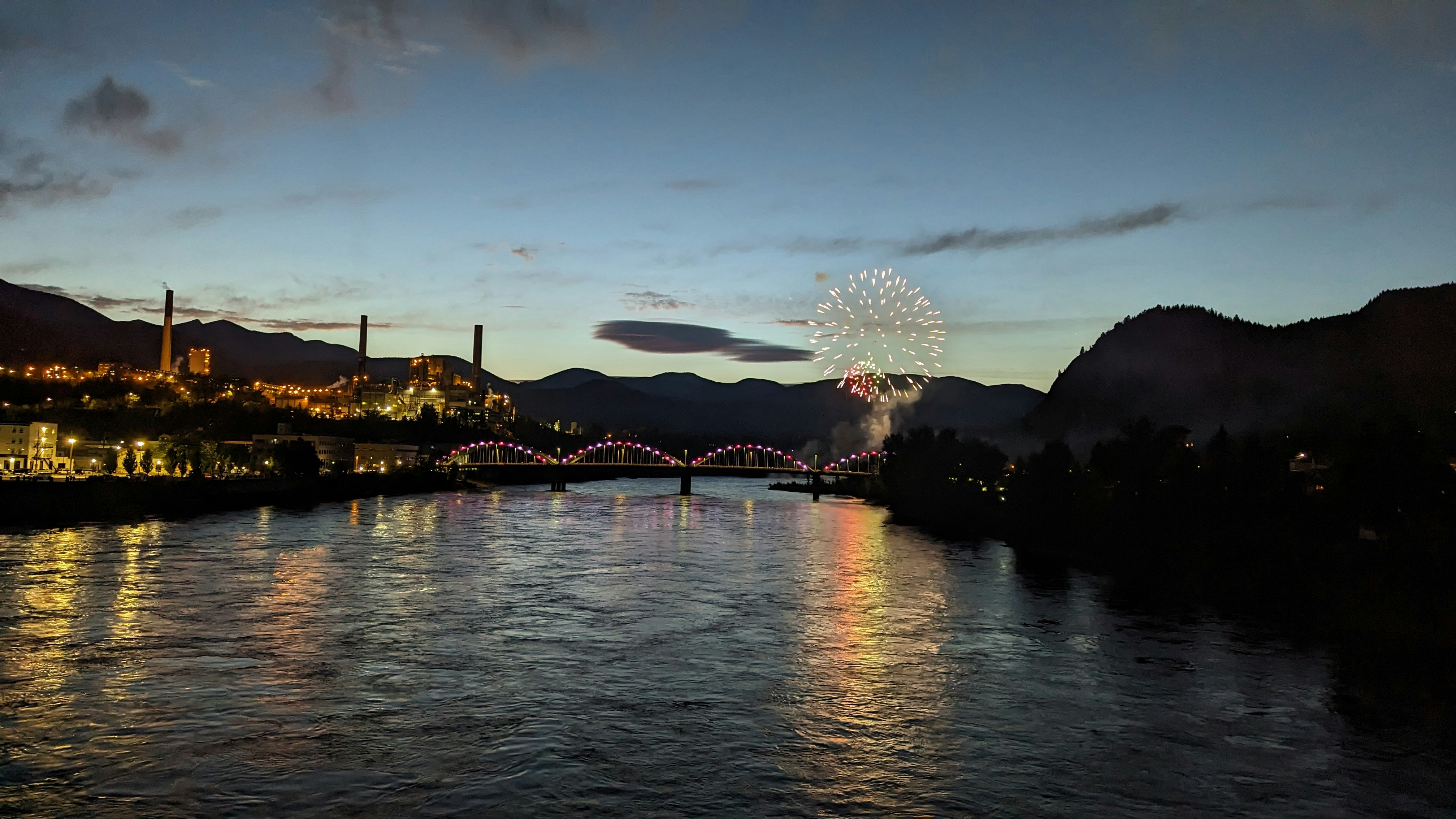 Fireworks Over a Night River Town