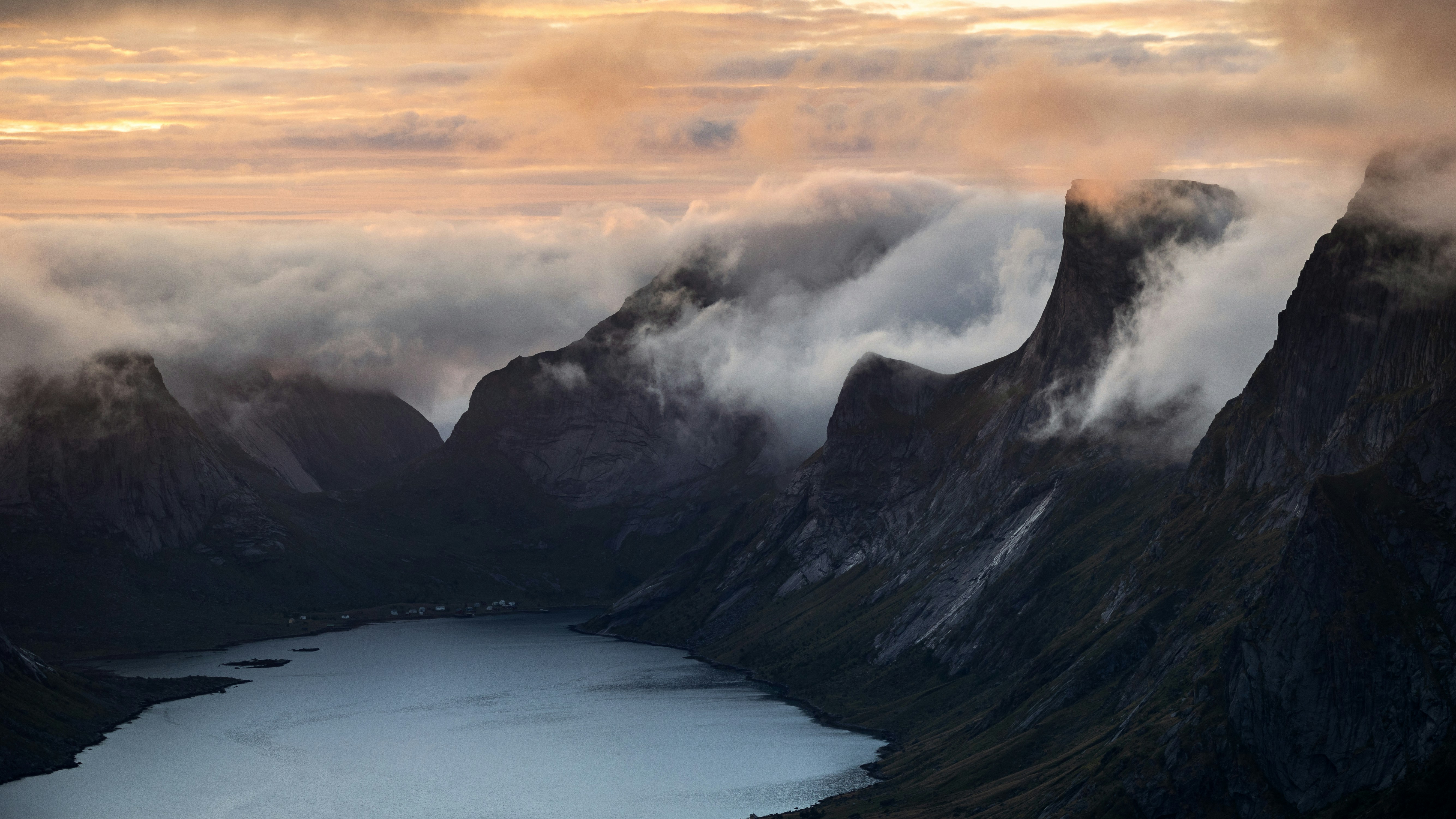 Mist over a Silent Fjord: A Mountain Pass at Dusk