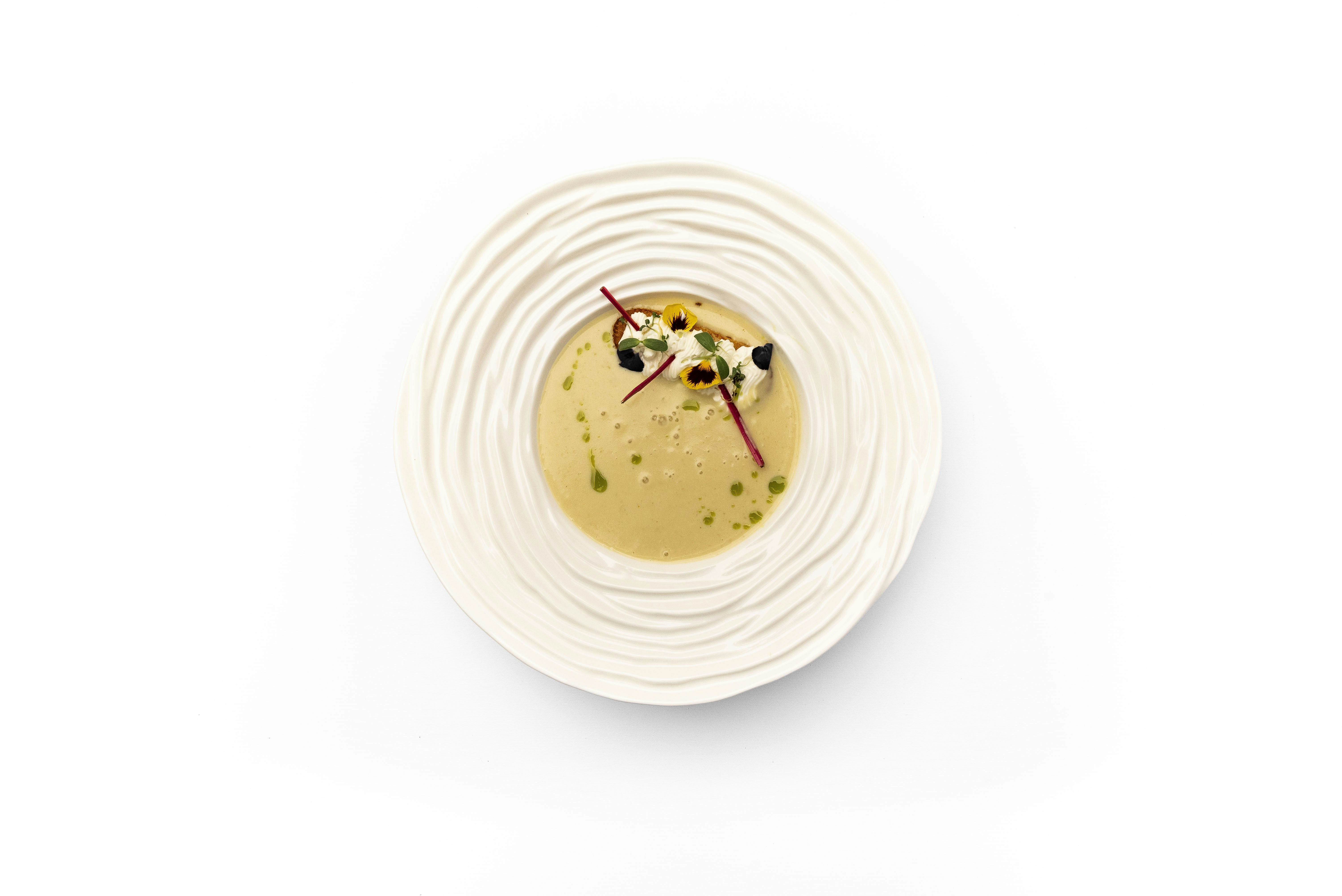 Minimalist Gourmet: A Top-Down Dish in a Ringed Plate