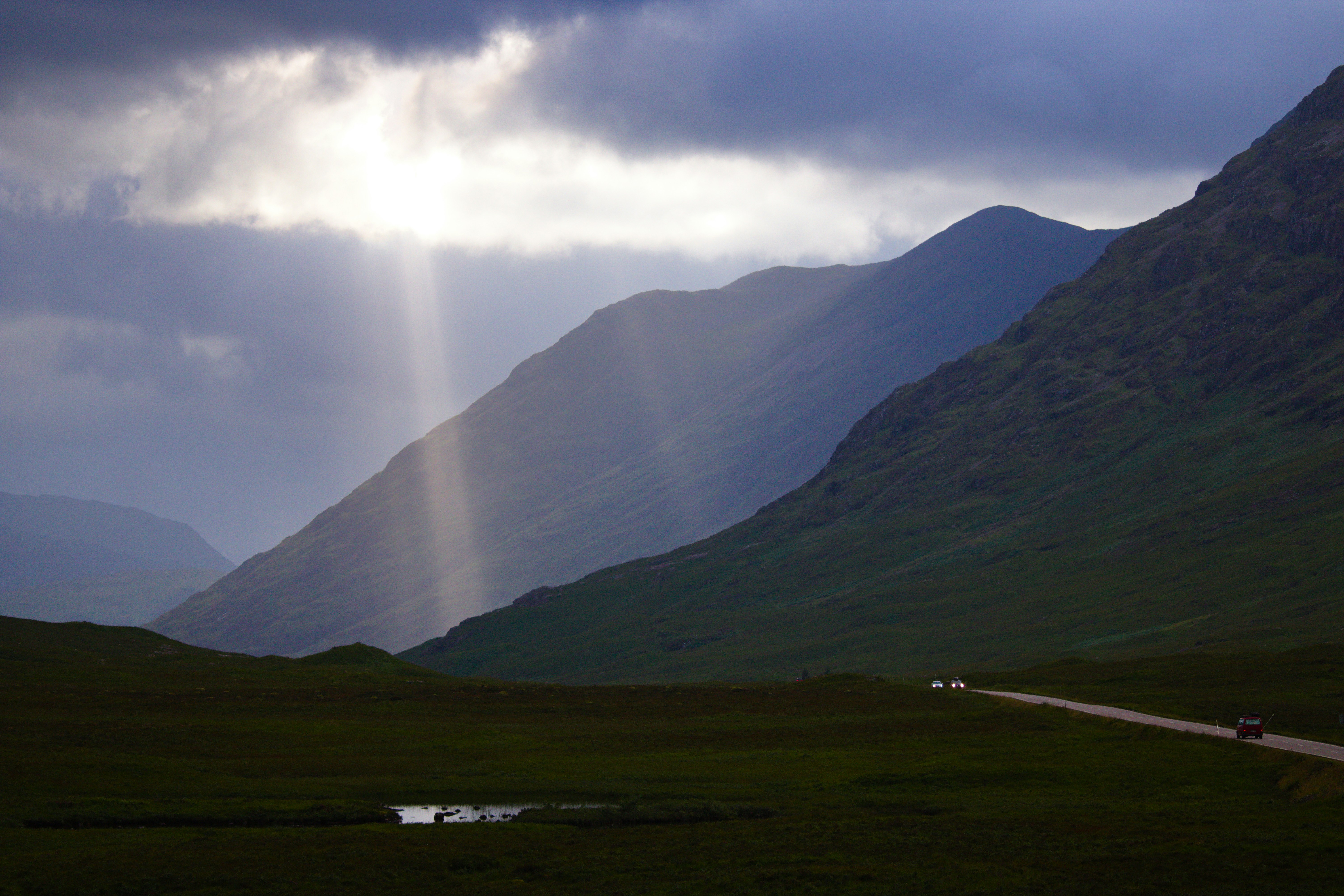 Sunbeam Through Valley: A Quiet Mountain Pass Emerges
