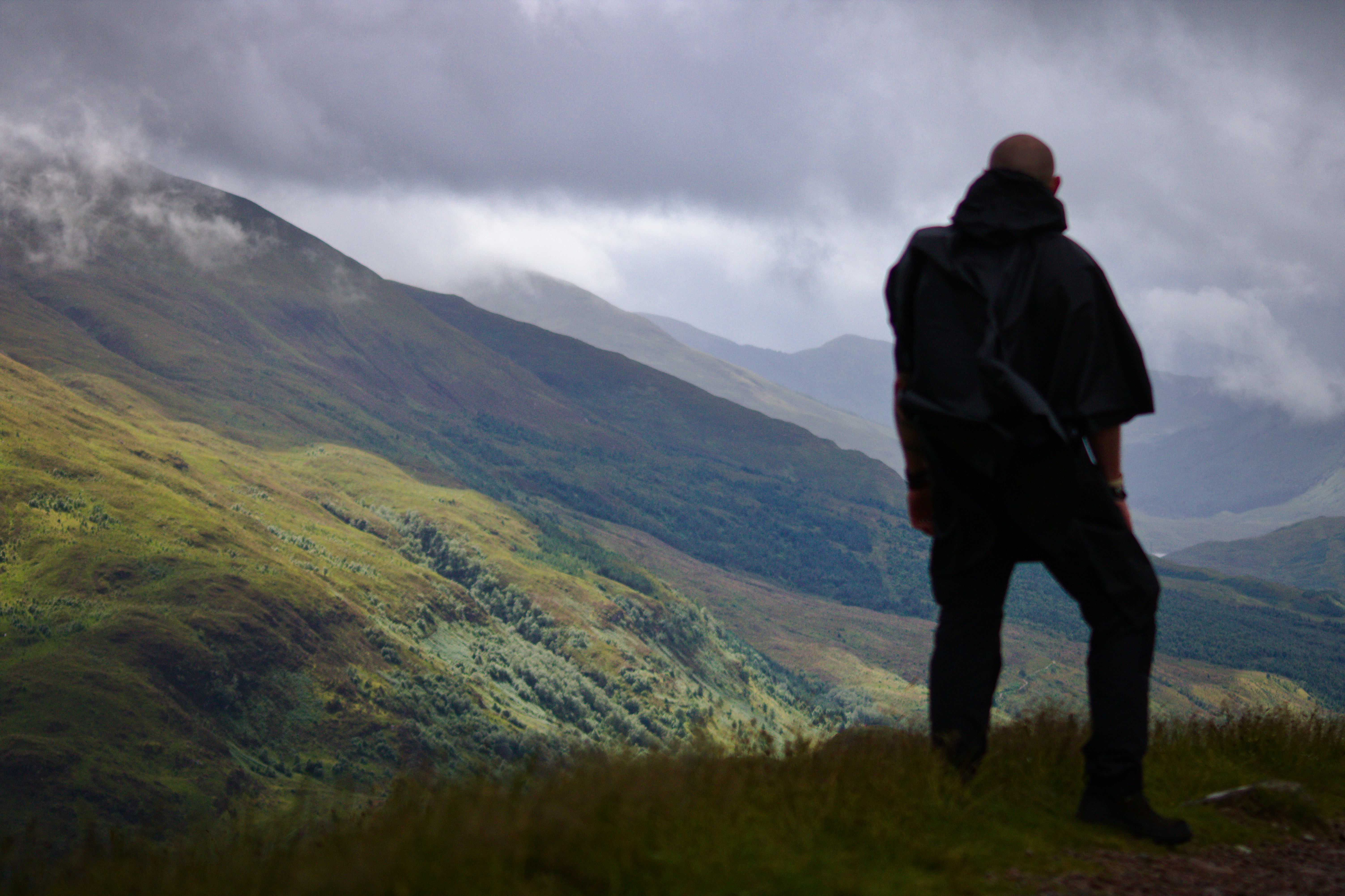 Horizon Harbinger: A Lone Wanderer Stares Across Misty Valley