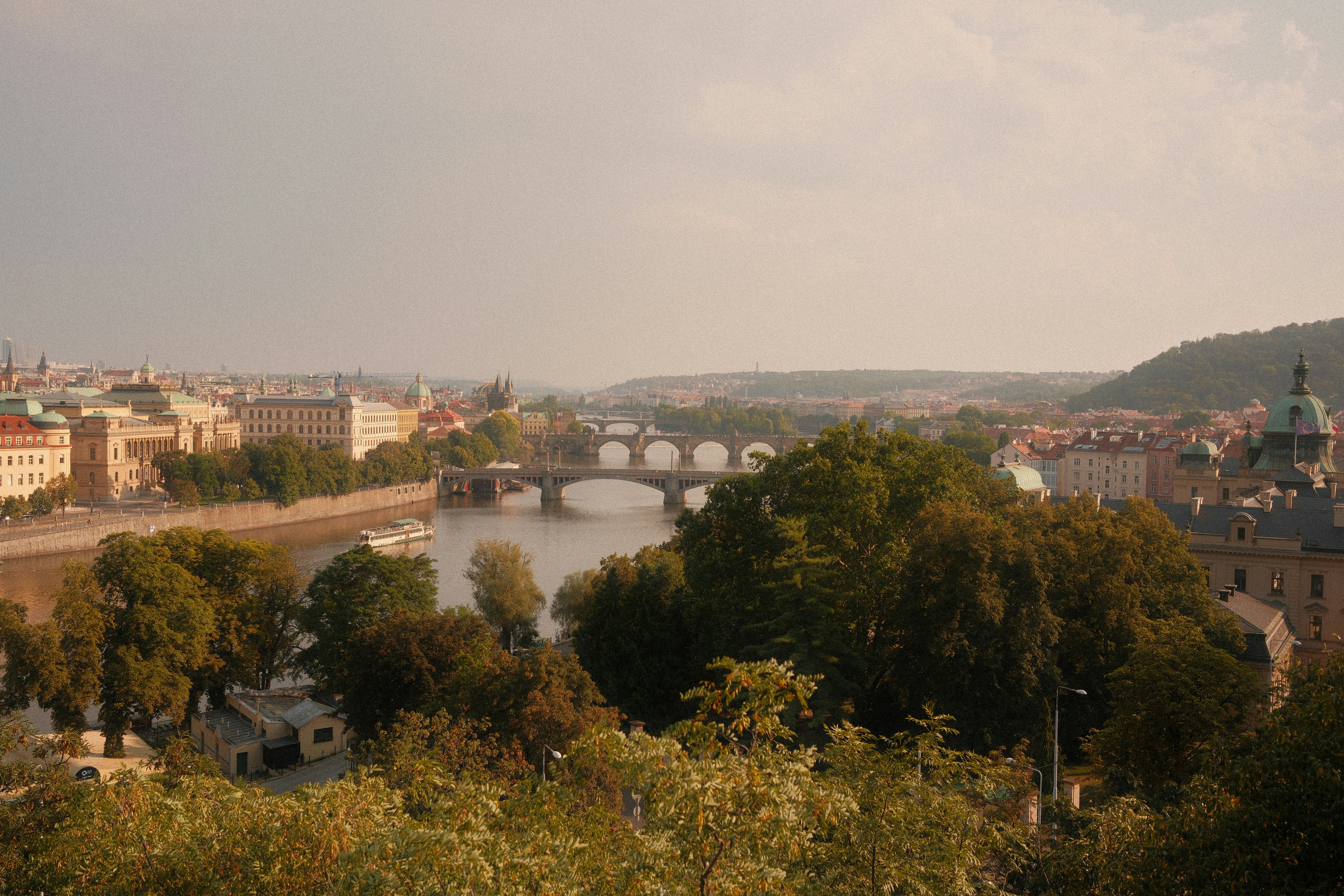 Riverside Arches at Dusk: A Panoramic Prague-Style Skyline