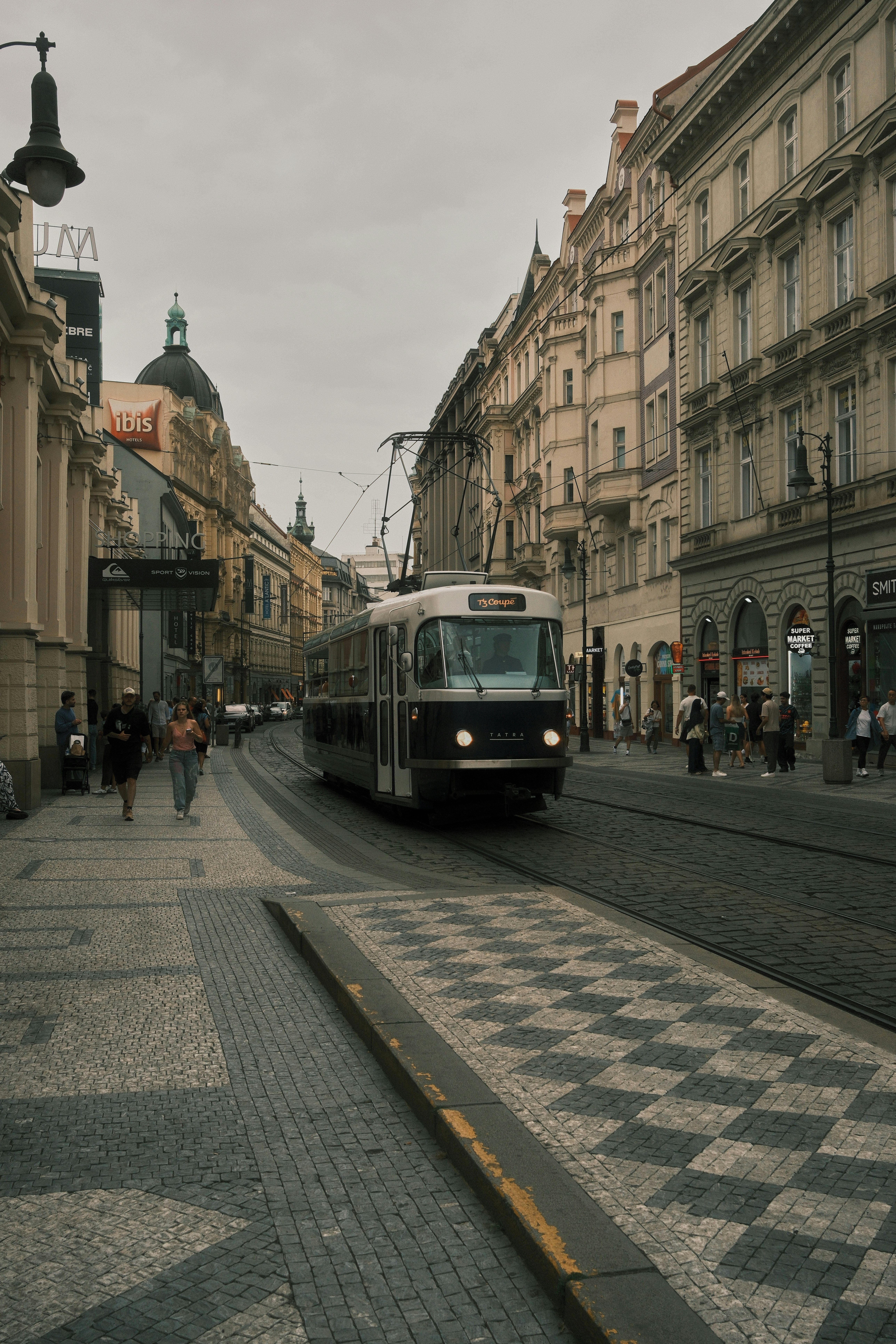 Gothic streetcar drift through a European boulevard