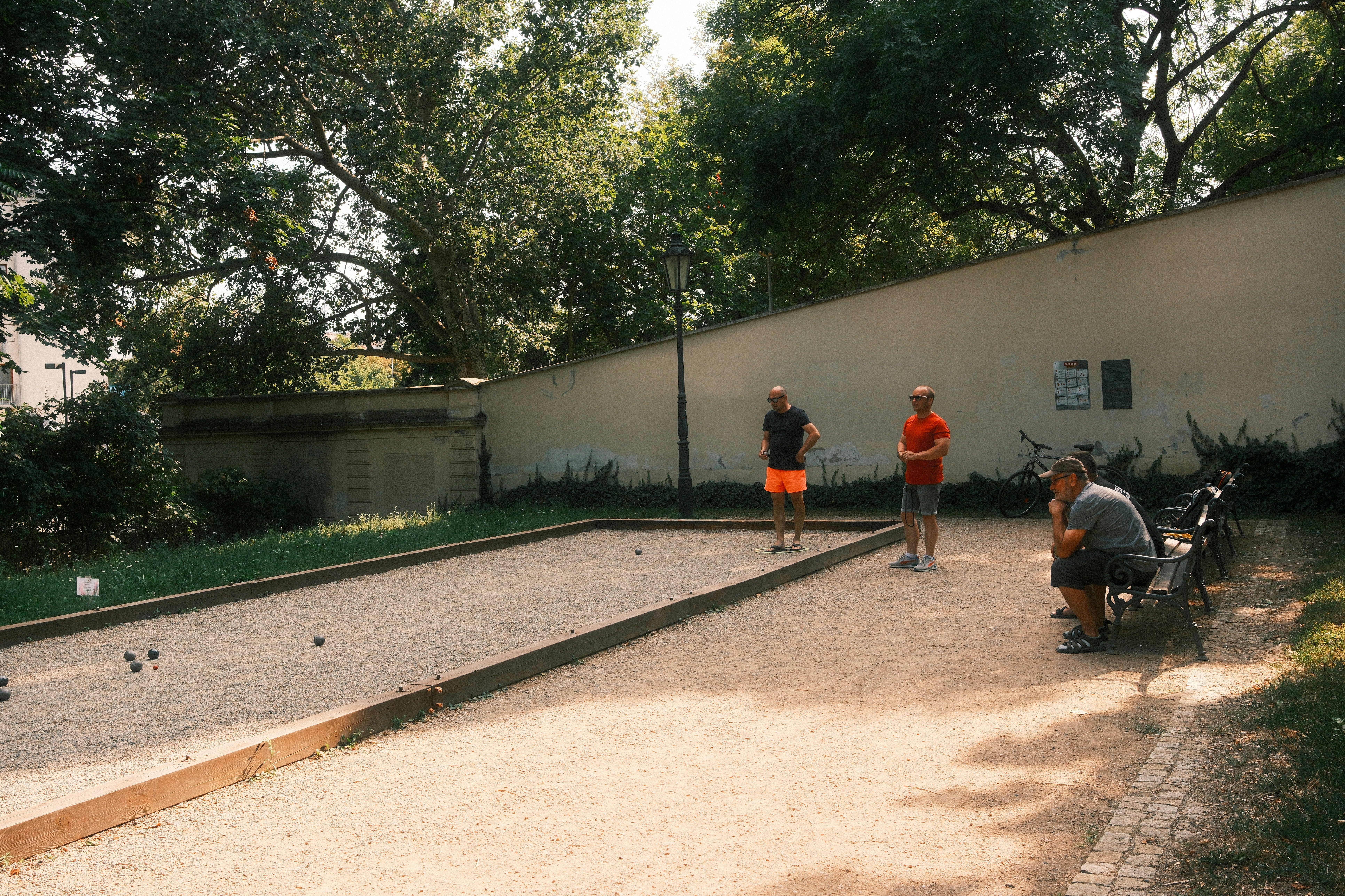 Lawn Bowls at Dusk: A Quiet Clip of Concentration by the Wall