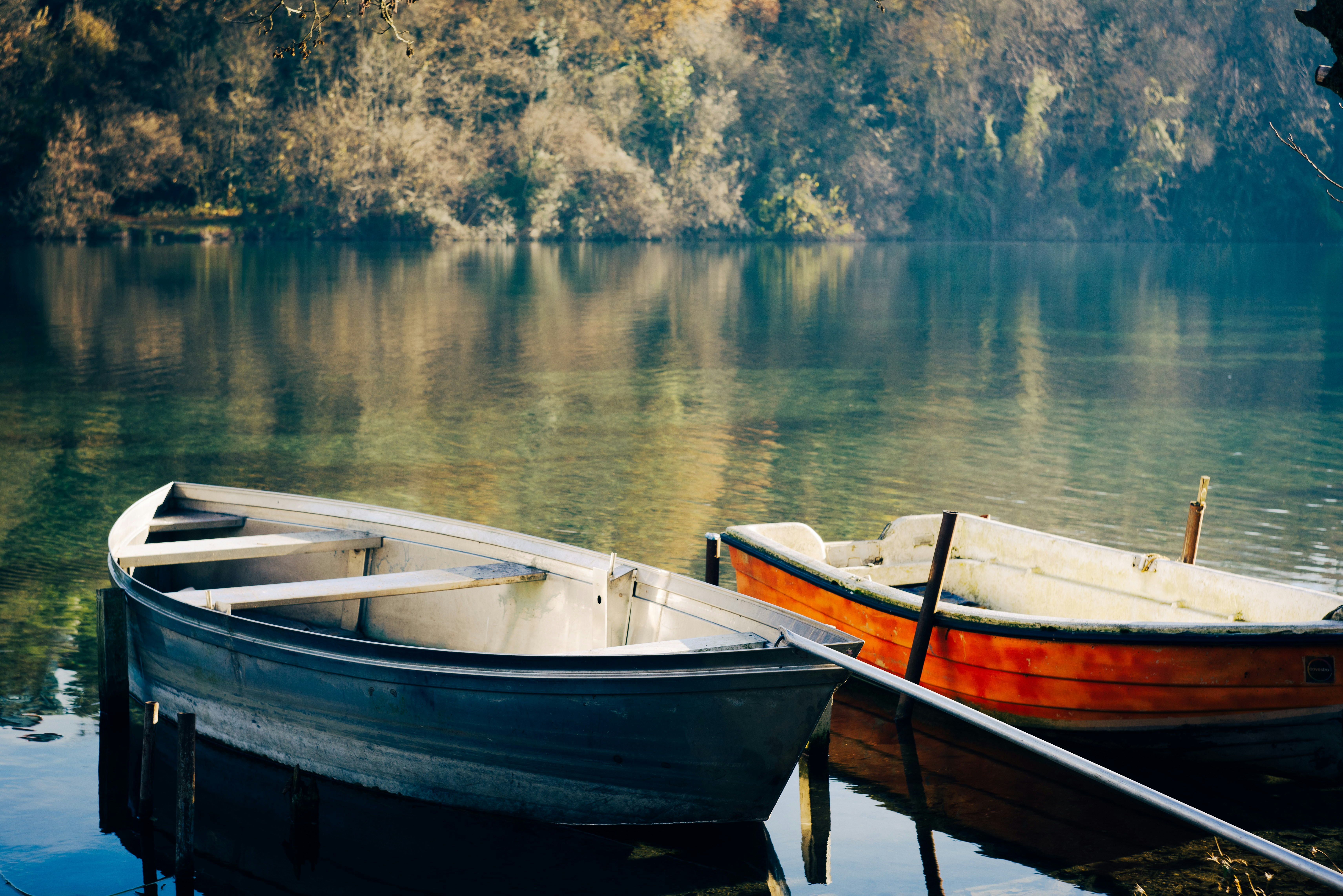 Docked Boats Rest at the Quiet Lake's Edge