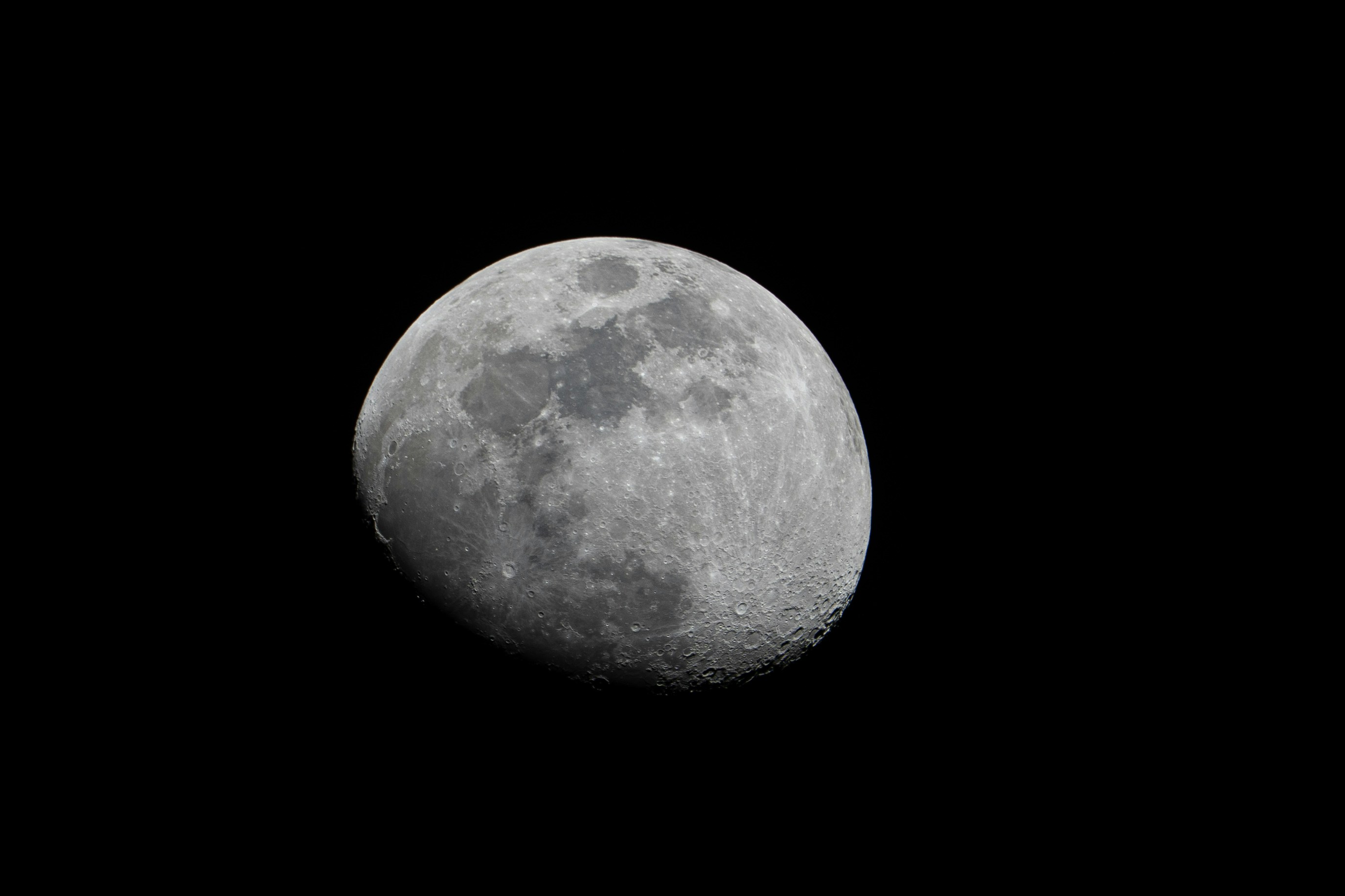 Muted Satellite: The Moon's Shaded Crescent Emerges from Space