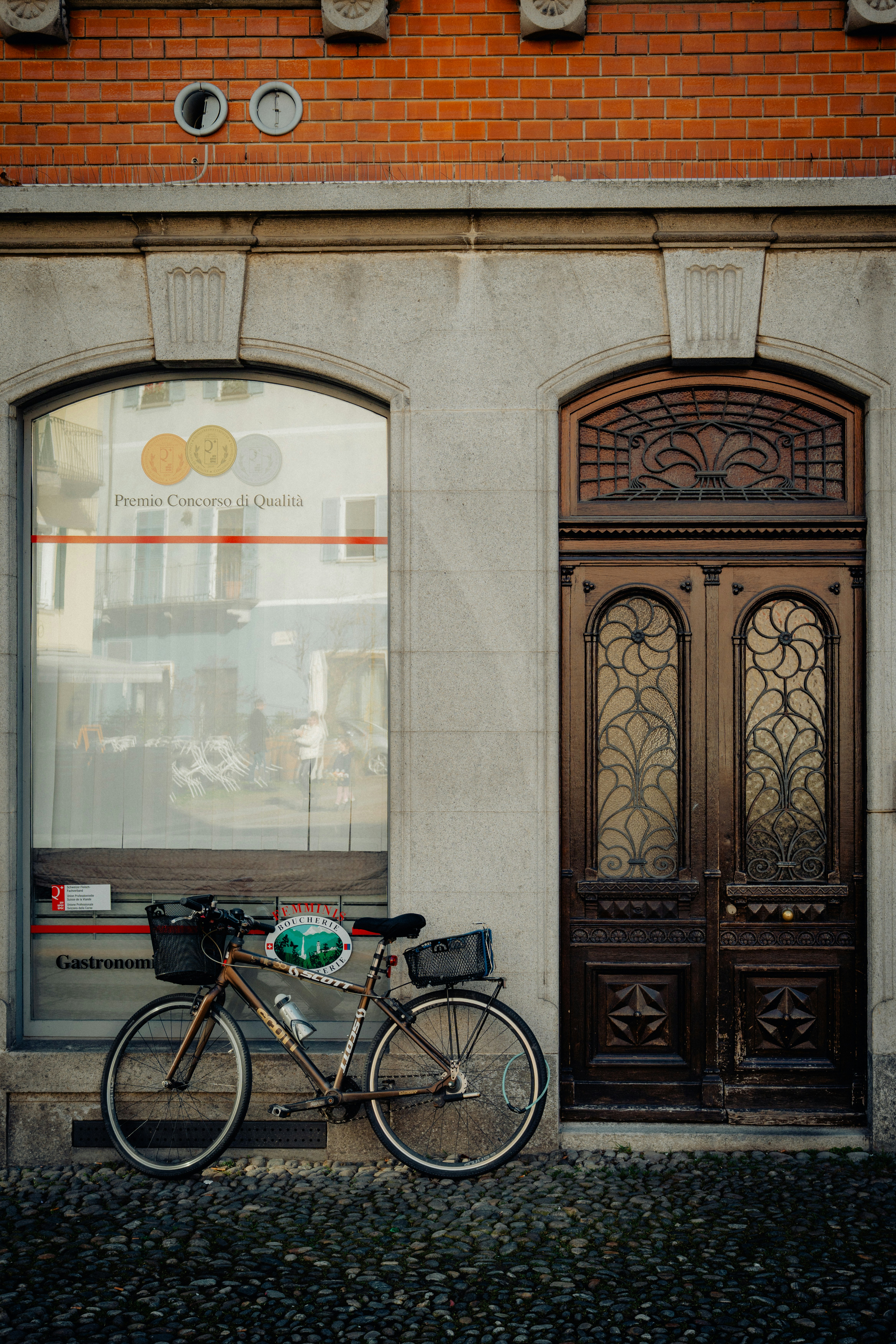 Bike by the Arched Door: Quiet Street Portrait