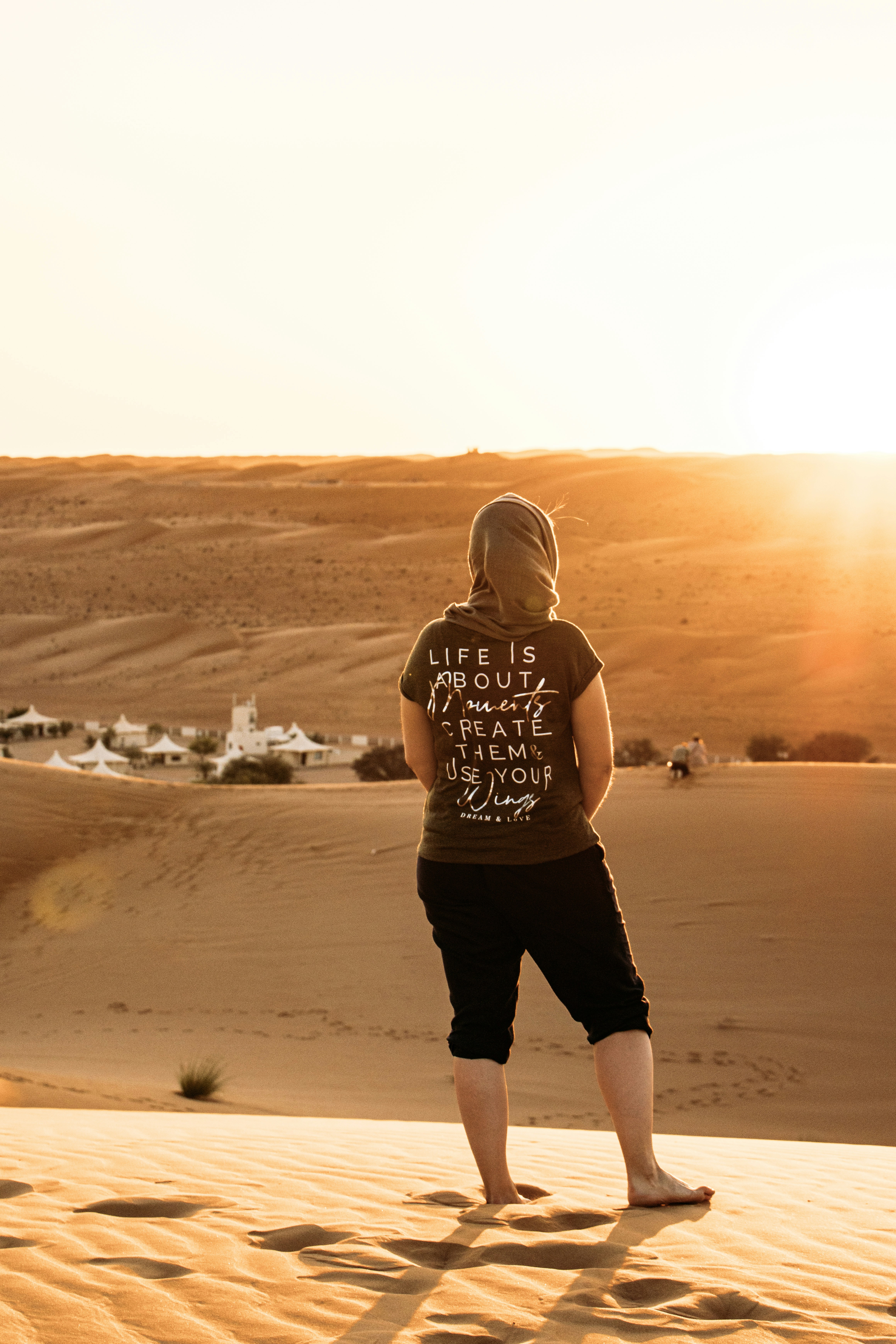 Desert Dunes at Dusk: A Wanderer Stands Still