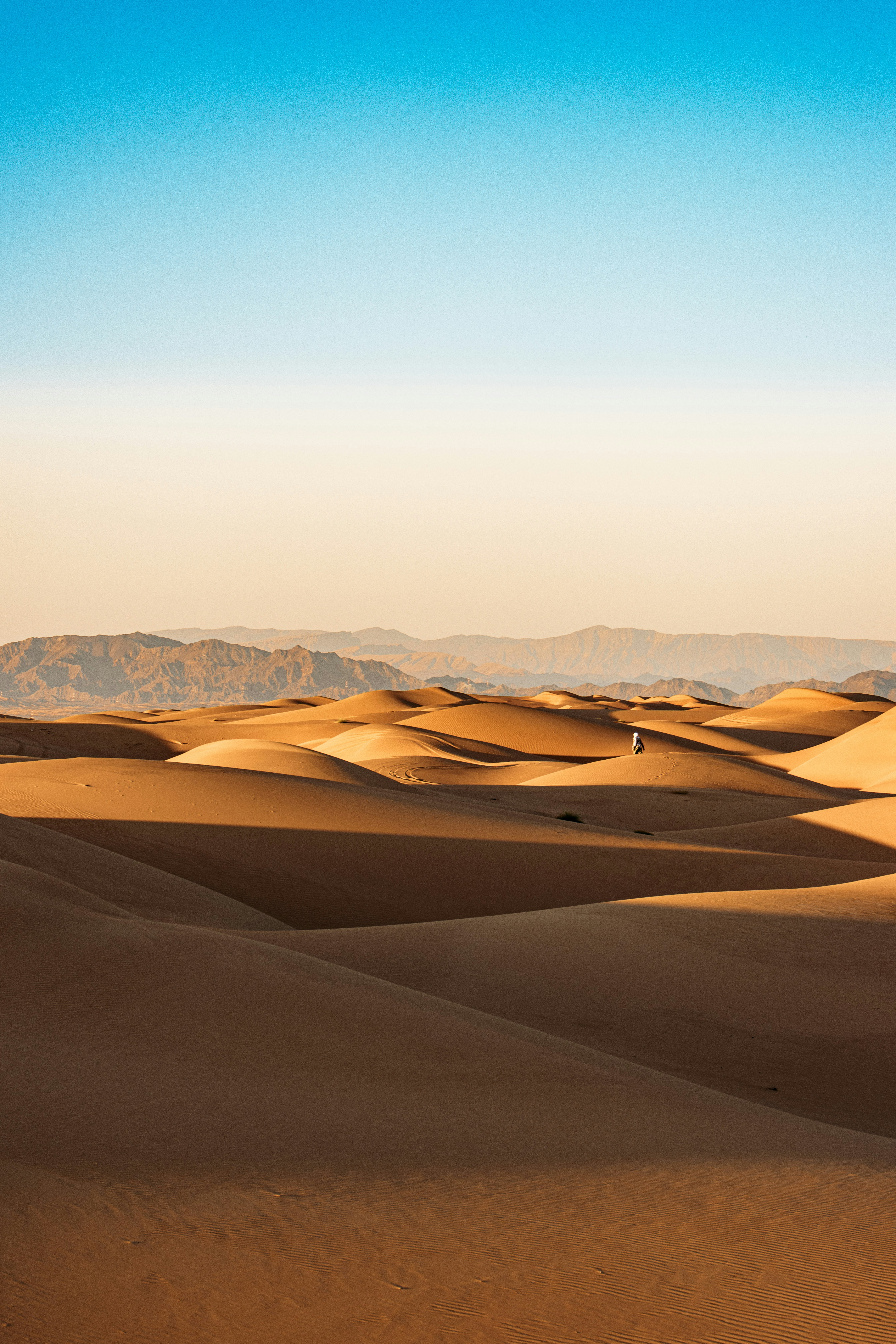 Desert Dunes Under a Wide Blue Sky