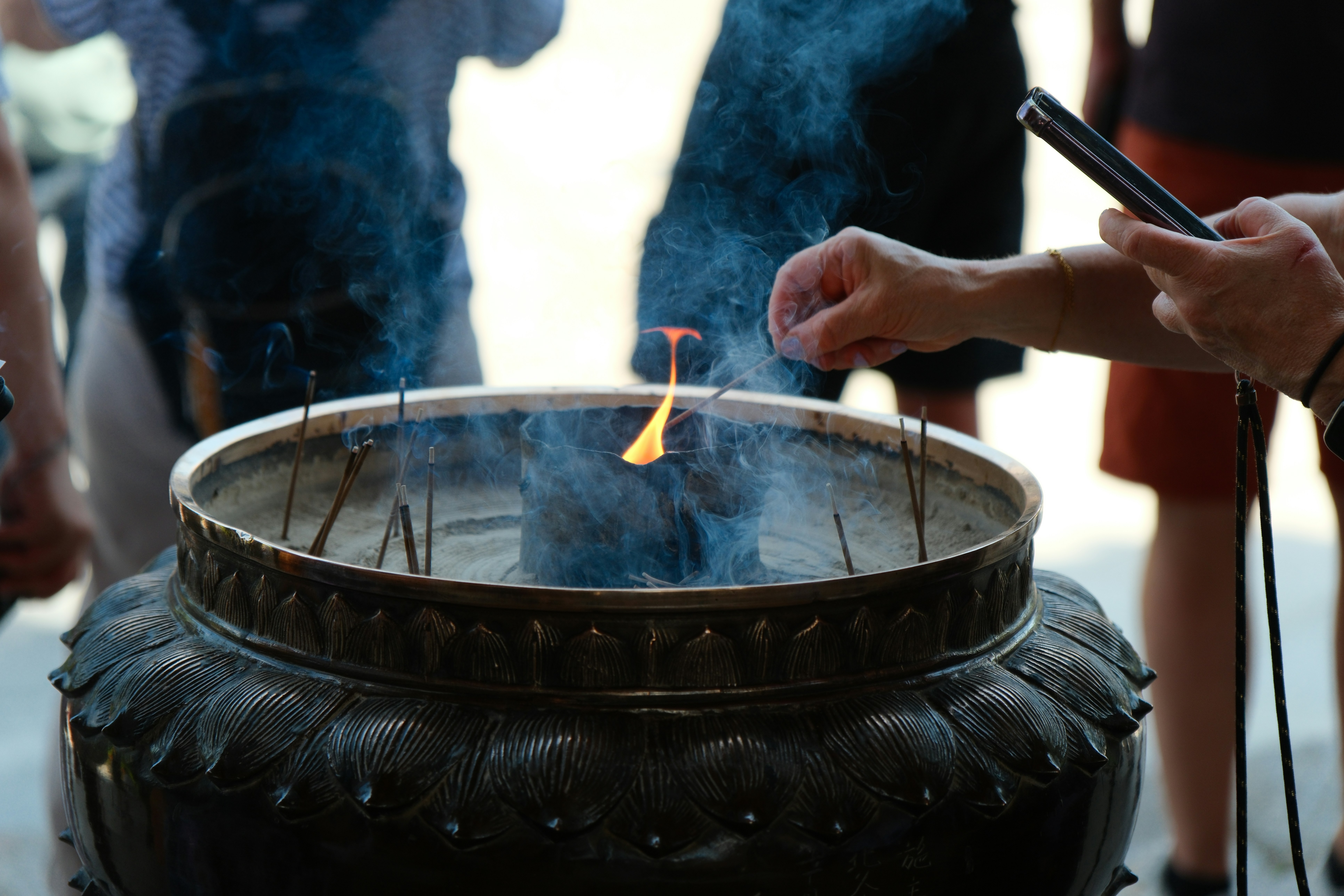 Flame at the Vessel: A ceremonial moment captured from above
