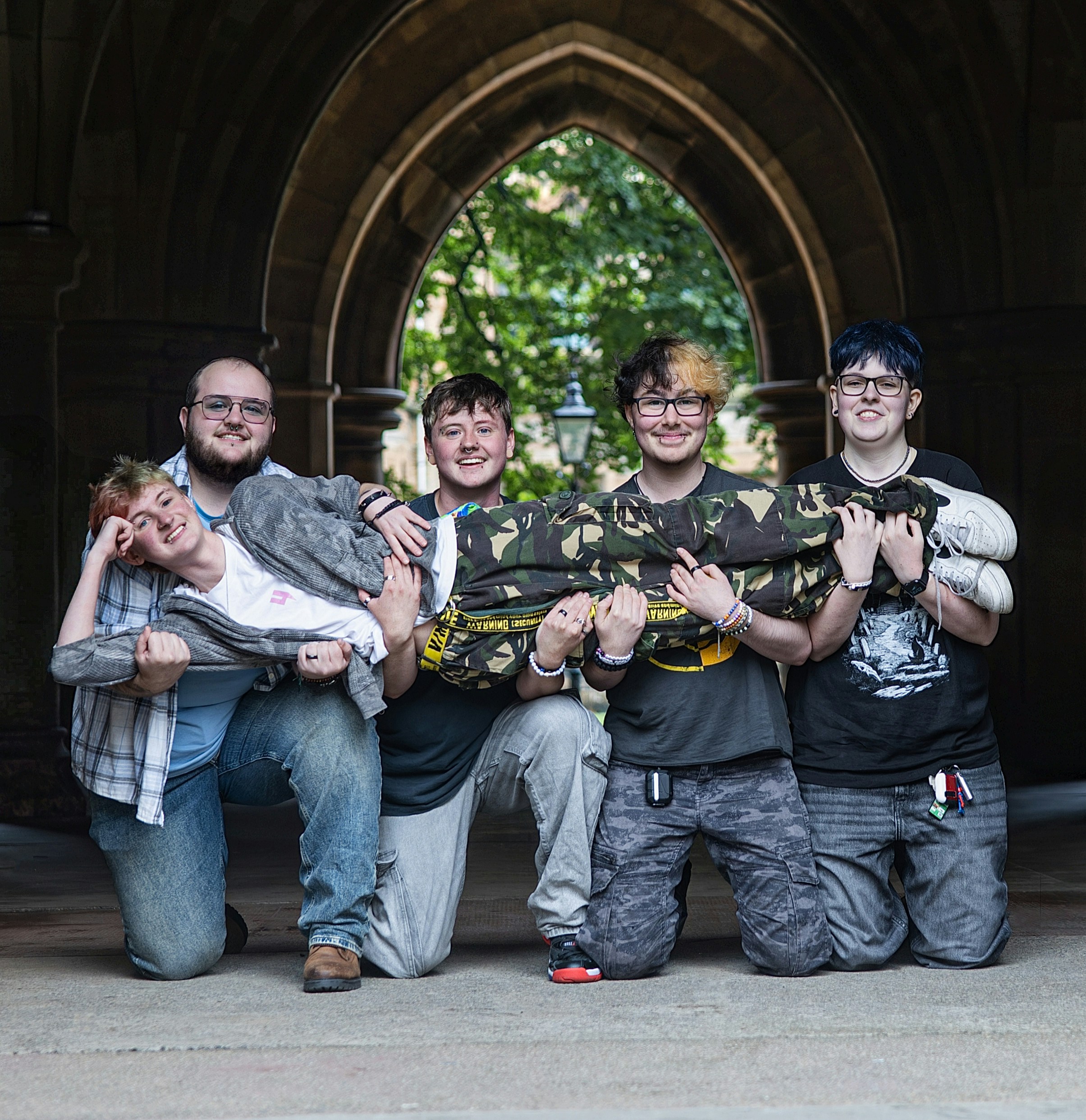 Circle of Strength: A Shared Pose Under Stone Archway