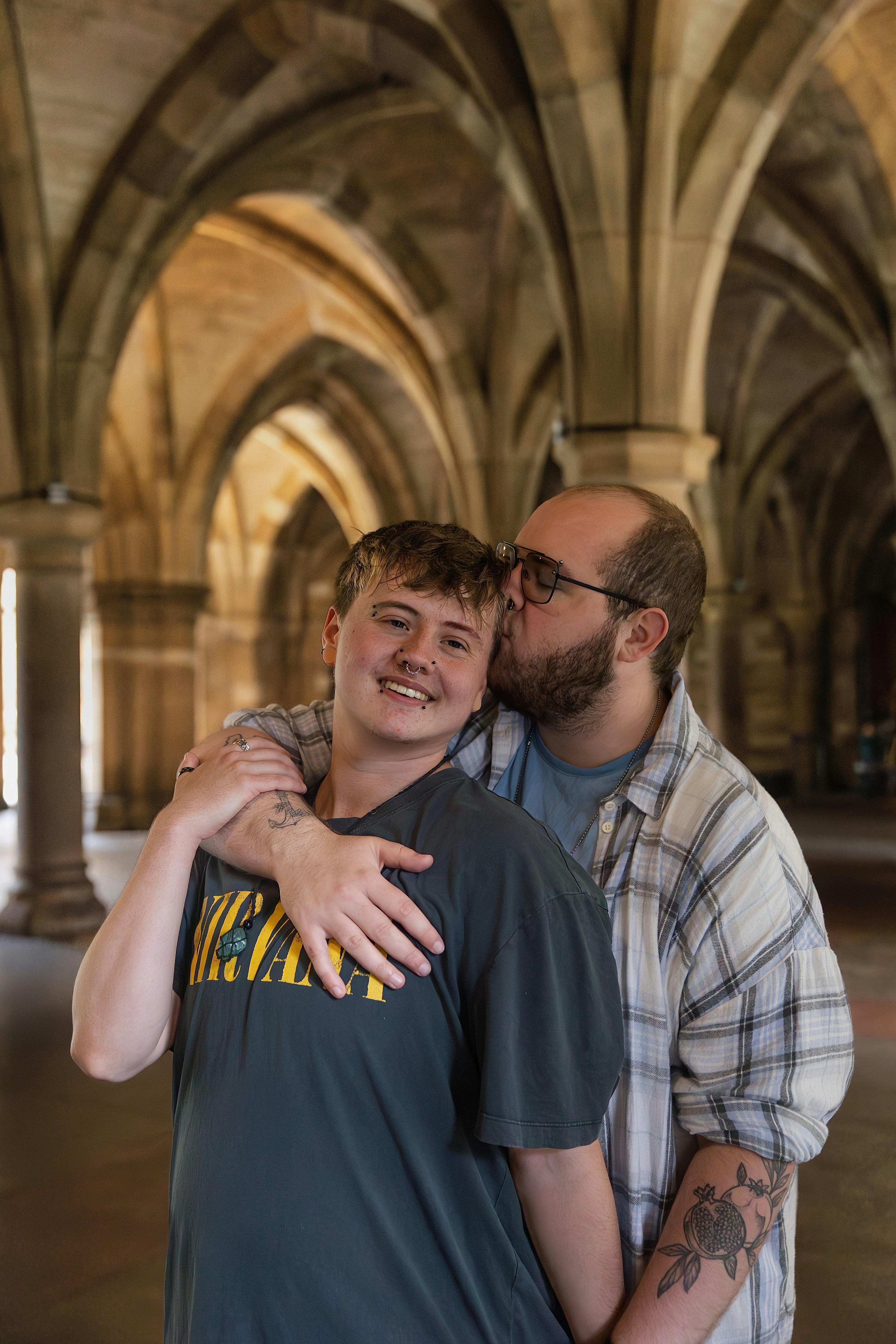 Handshake of Warmth: Brotherly Kiss in a Gothic Corridor
