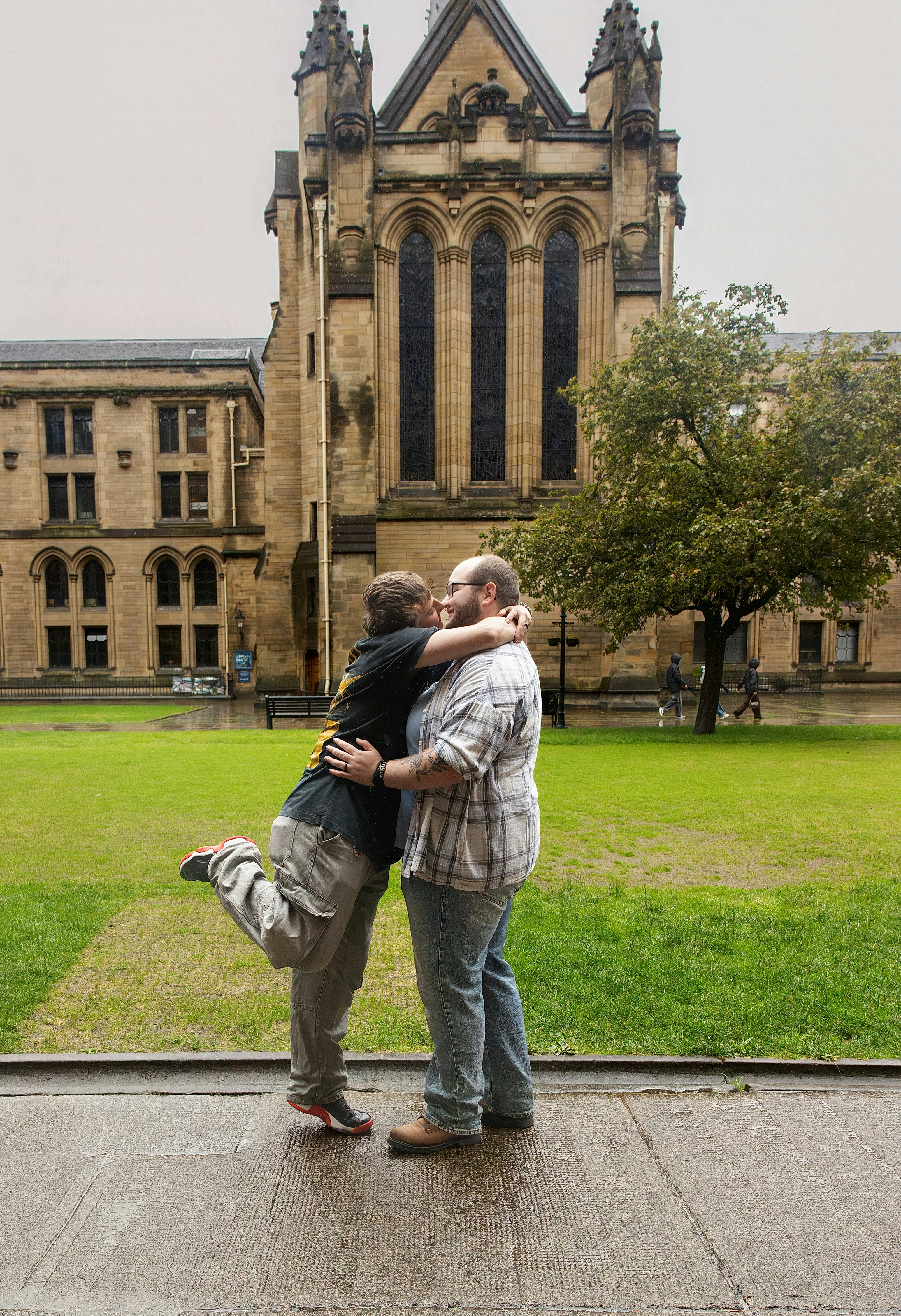 Kiss at the Cathedral Steps: A Joyful Embrace Outdoors
