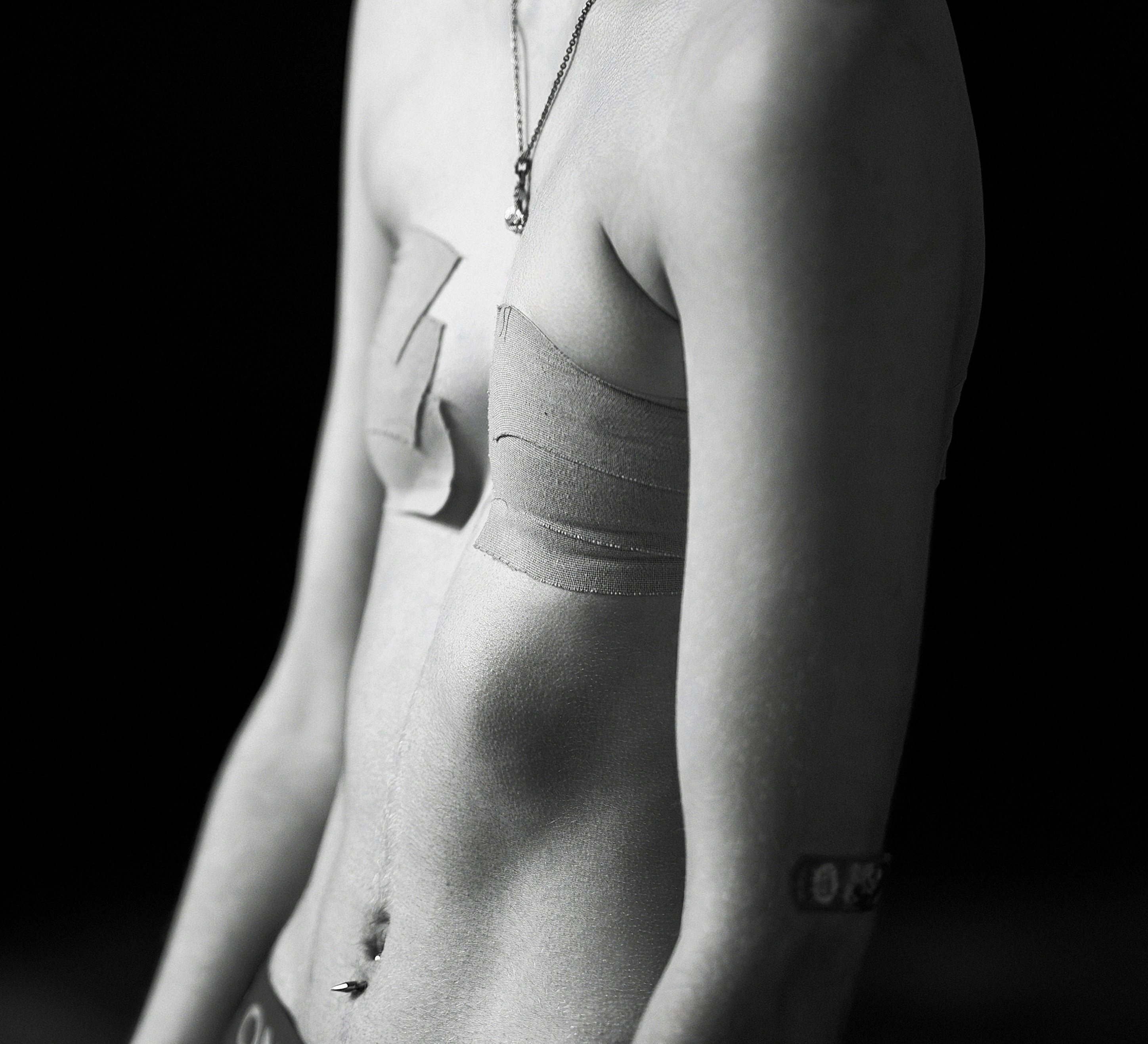 Bandaged Form: A Quiet Portrait in Mono