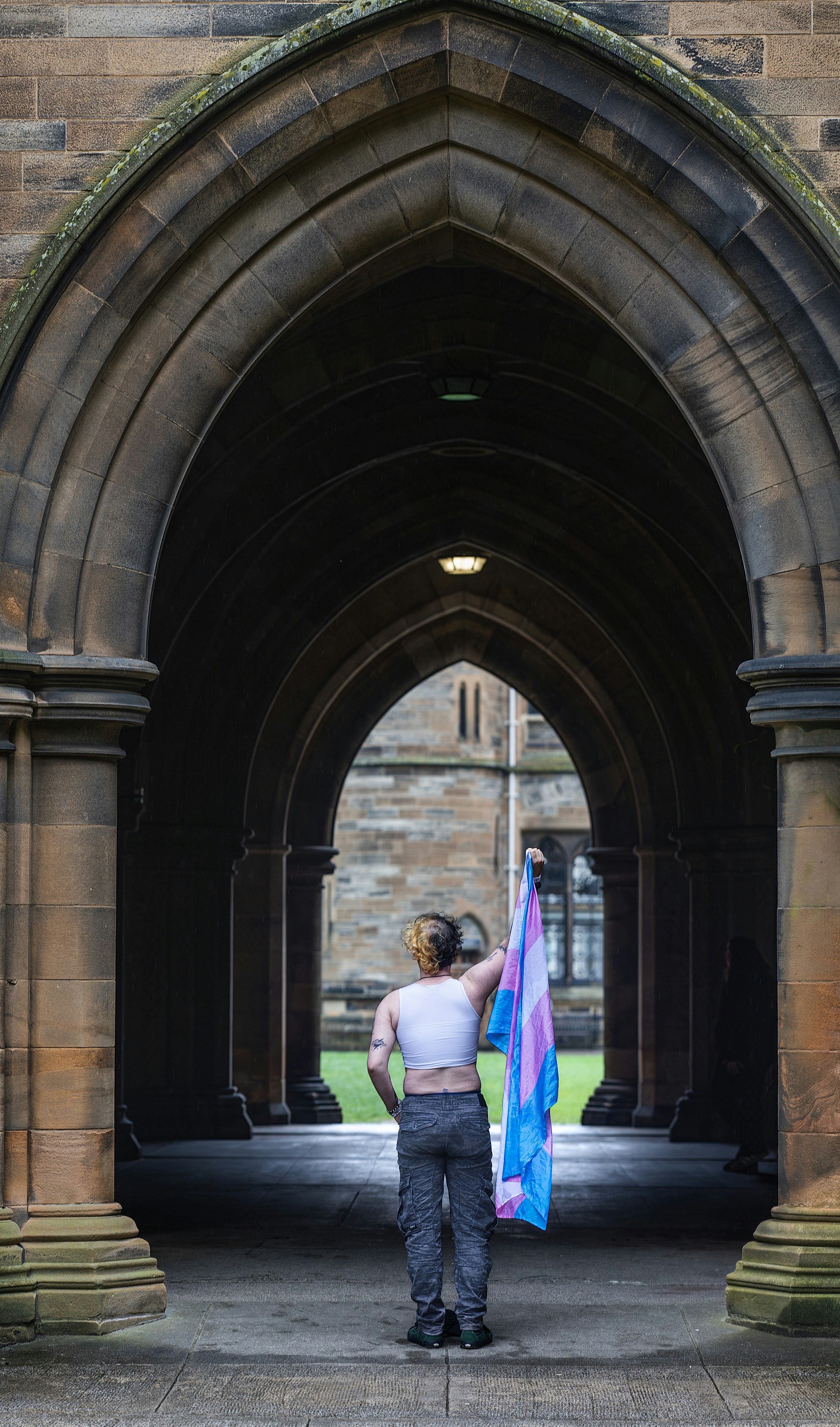 Under the Gothic Arch: a Pride Flag at the Portal