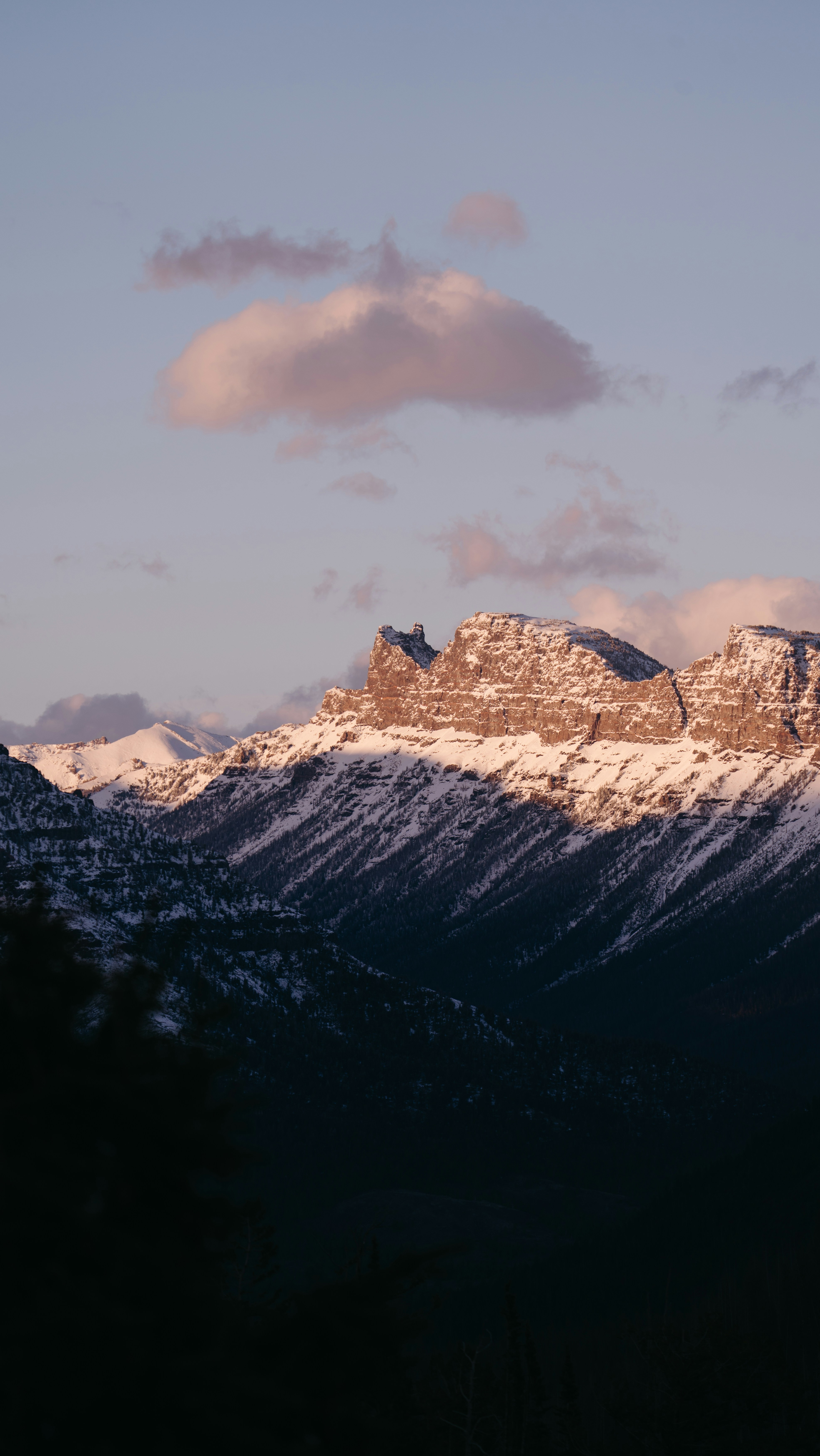 Snow-kissed ridgeline at golden hour