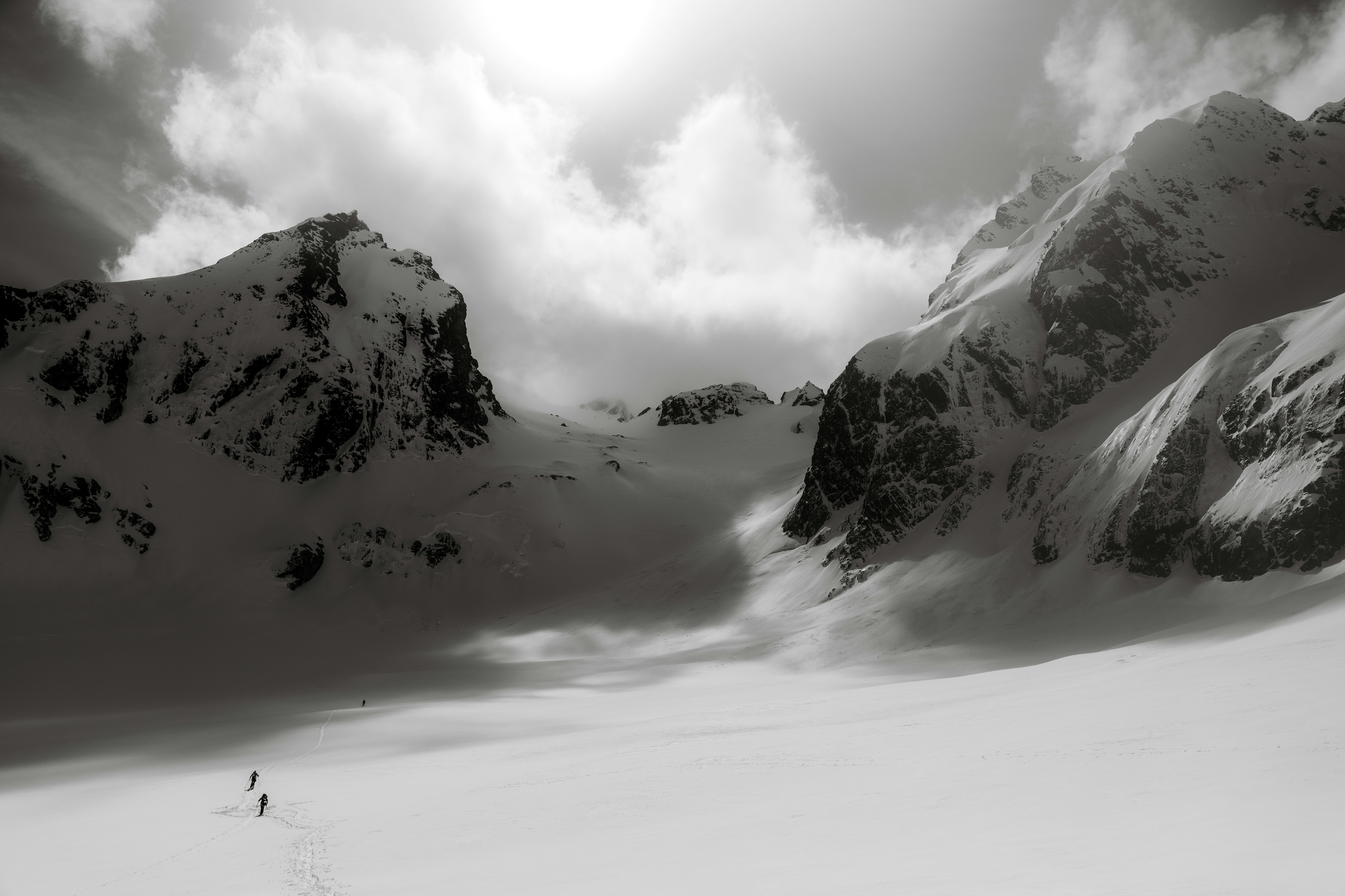 Snowbound Basin under looming peaks
