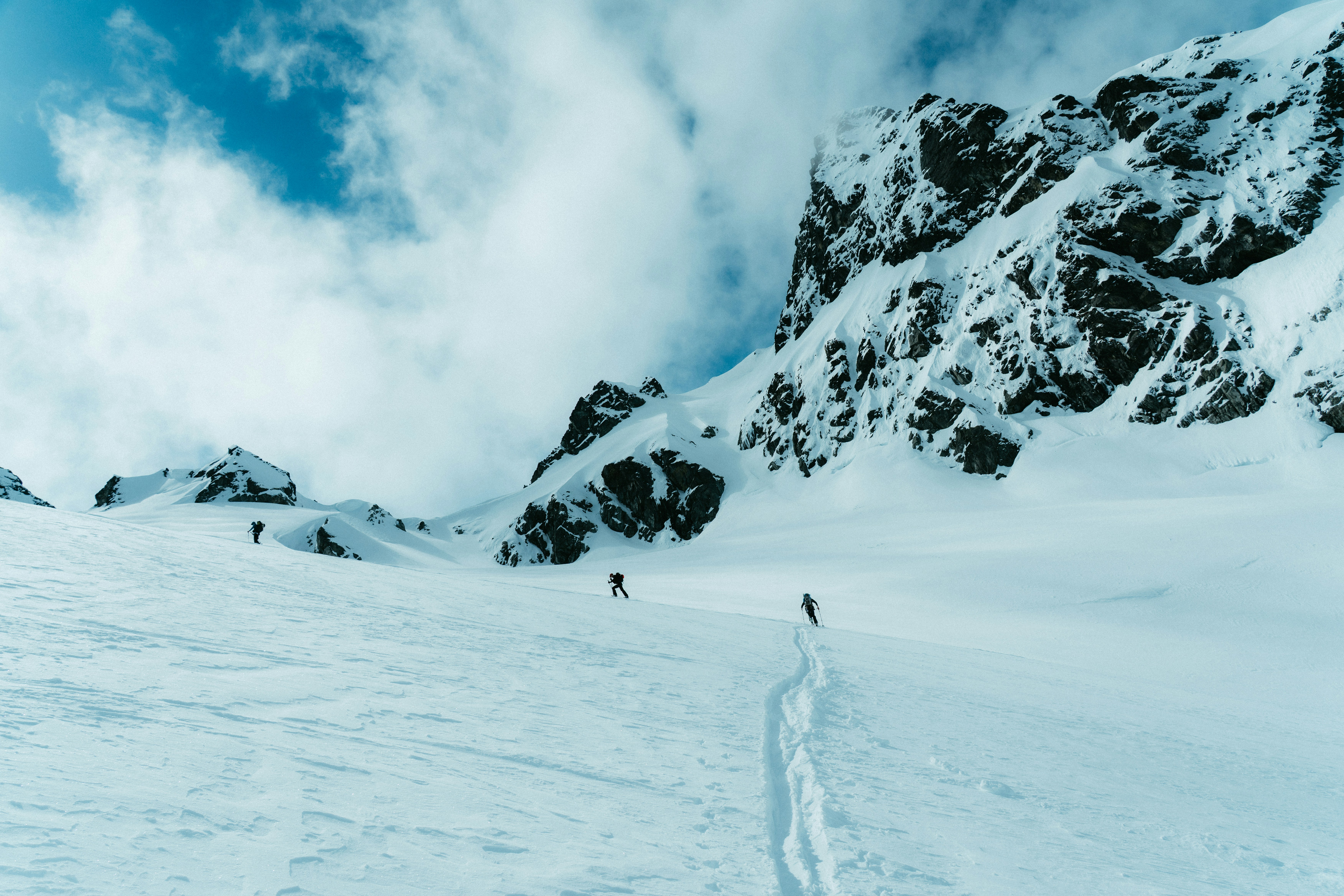 Climbers' Track Across Silent Avalanche Slopes