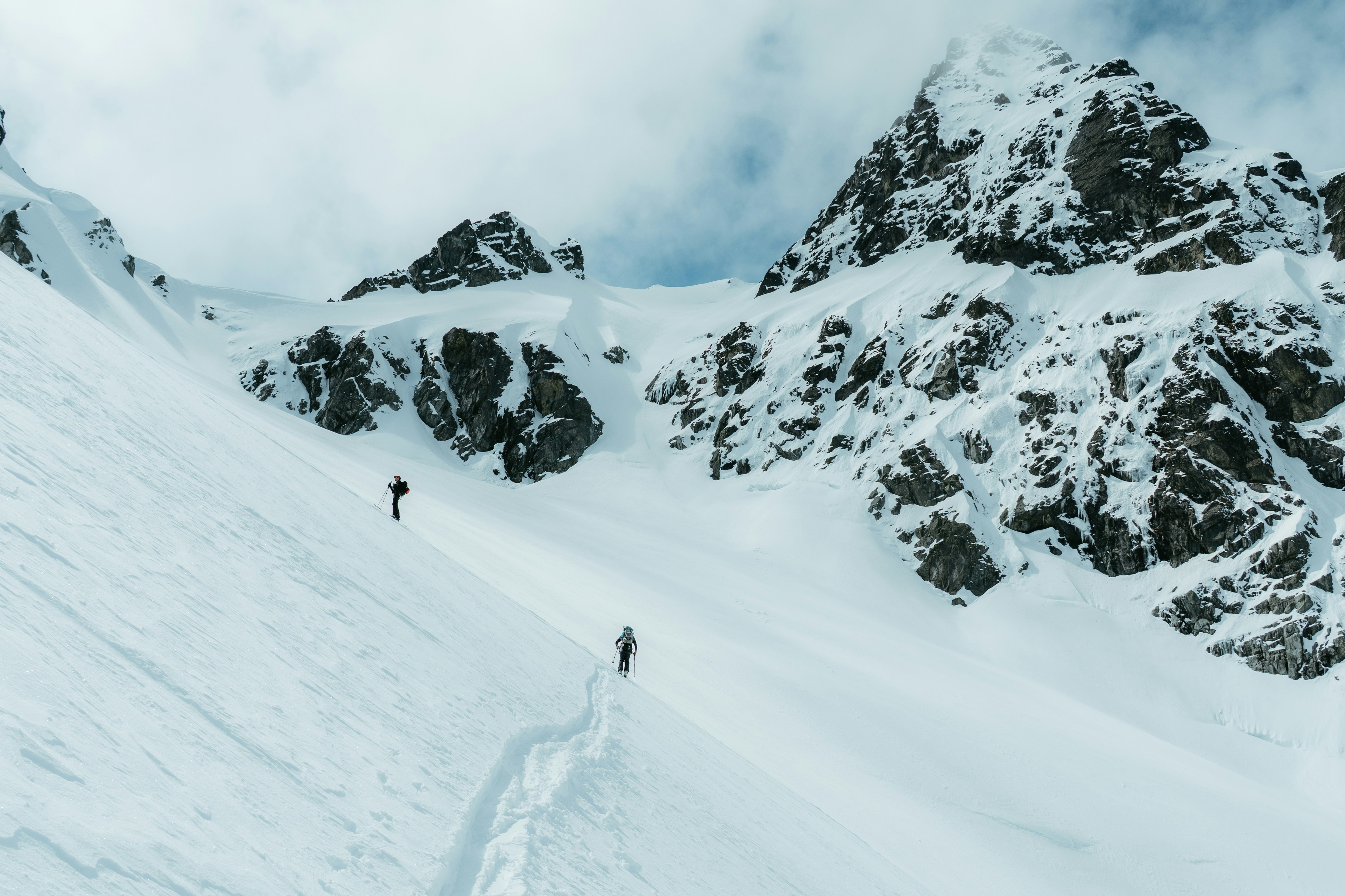 Snowbound Ascent: A Long Slope to Silent Peaks