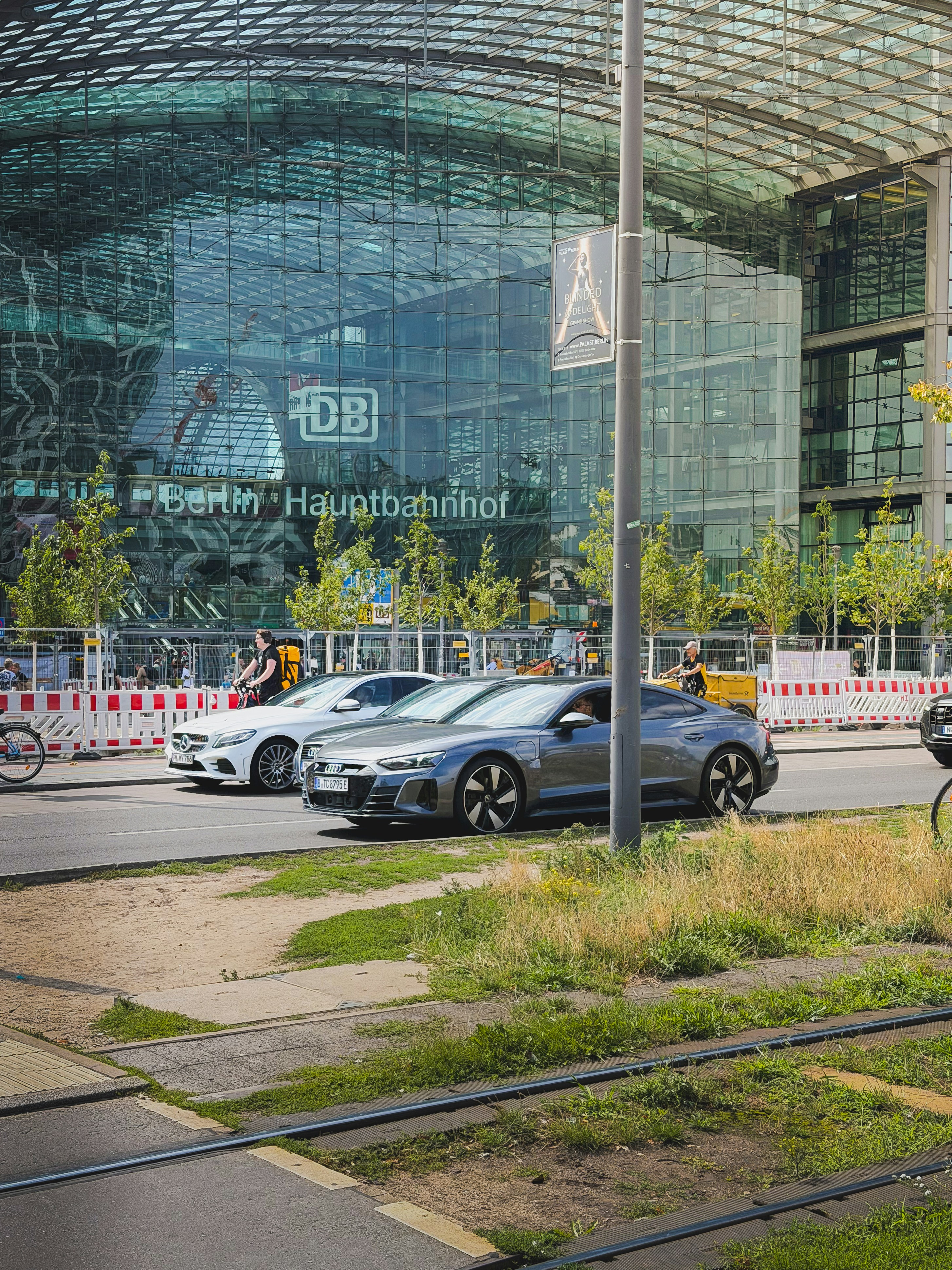 City Glass and Chrome: Cars at Berlin Hauptbahnhof Steps