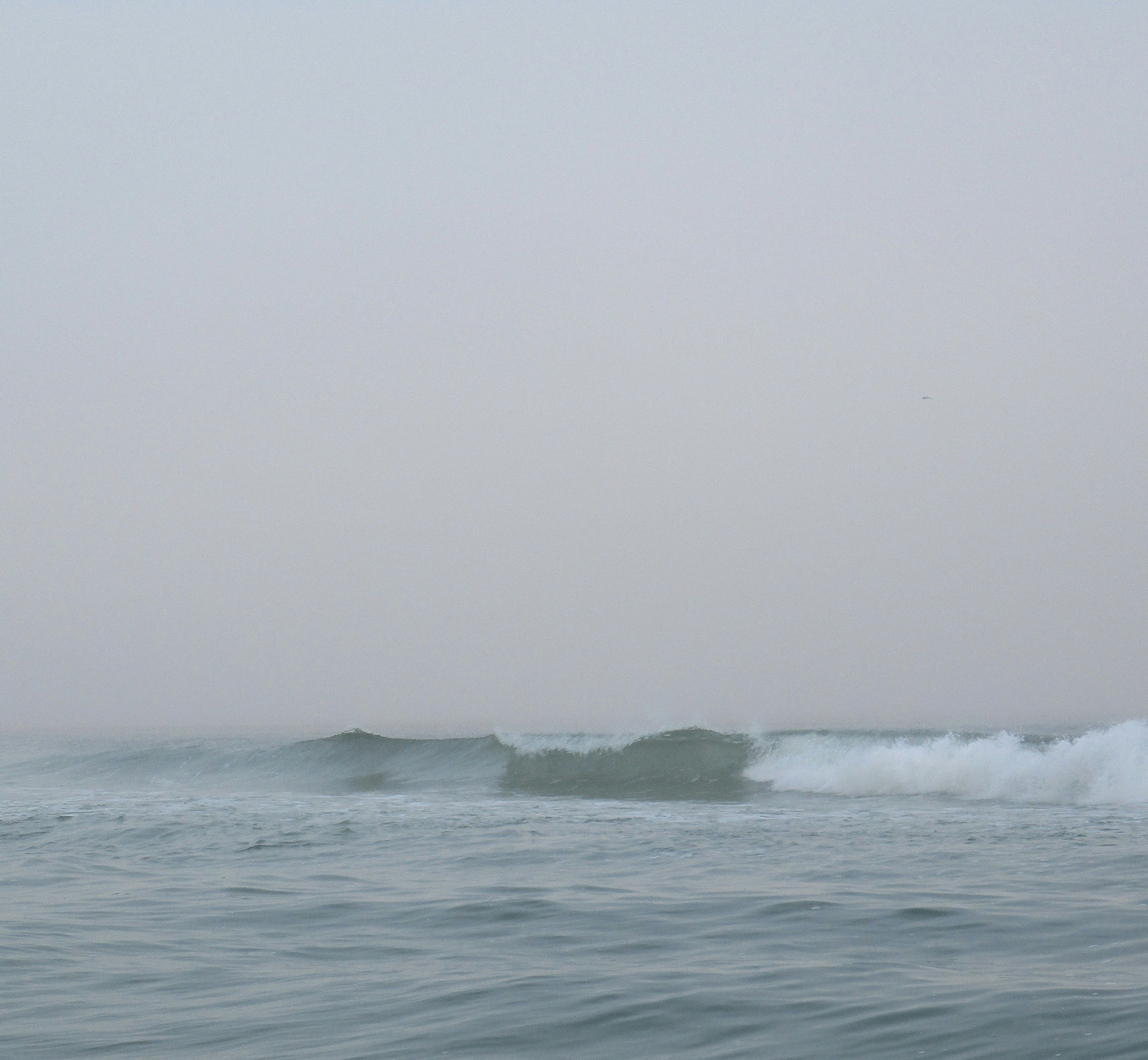 Dawn Mist over a Quiet Breaker