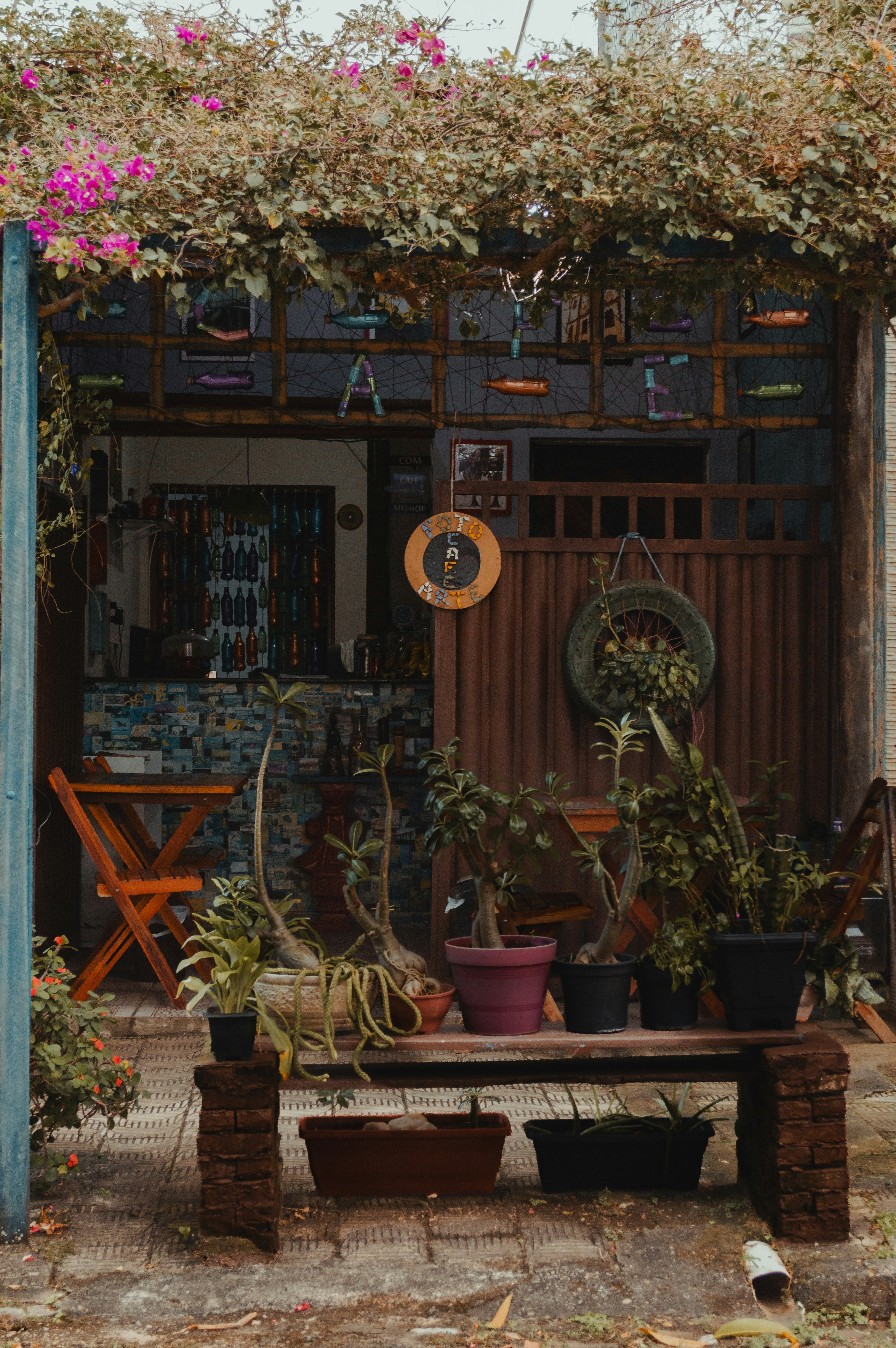 Cascading Flora over a Cozy Café Façade