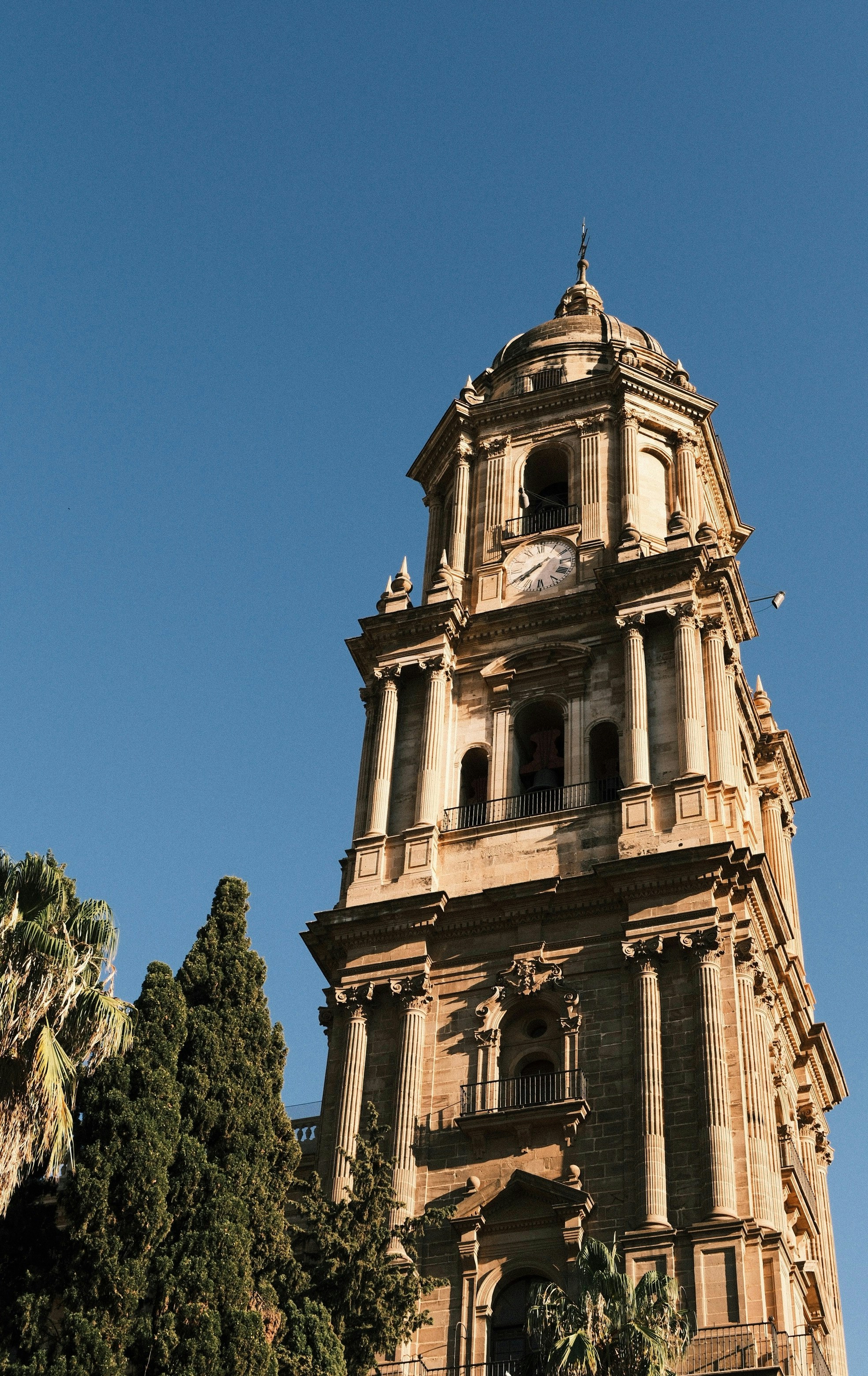 Clocktower Ascendant: A Sunlit Facade Reaching for the Sky