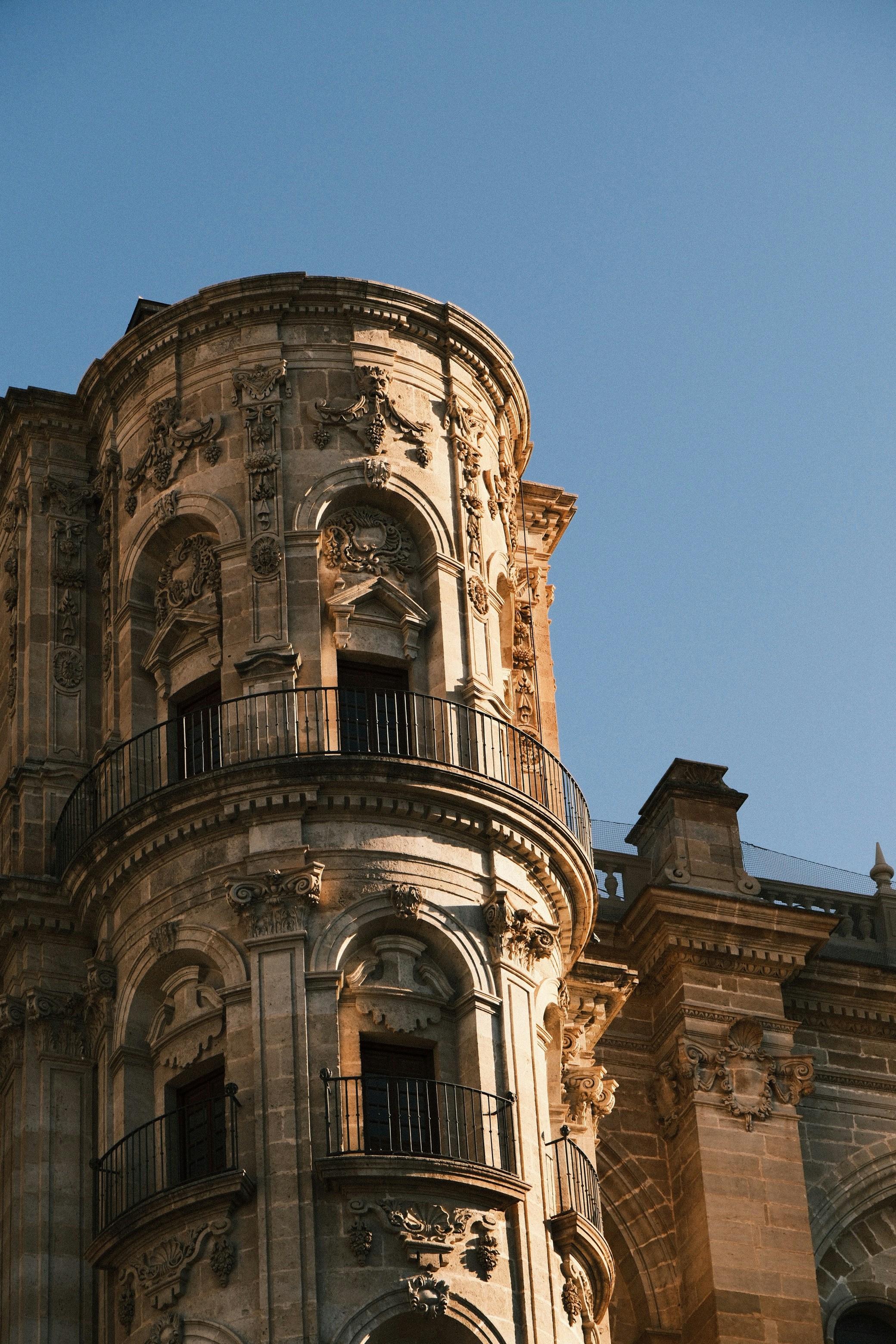 Ornate Turreted Facade Leaning into the Sky