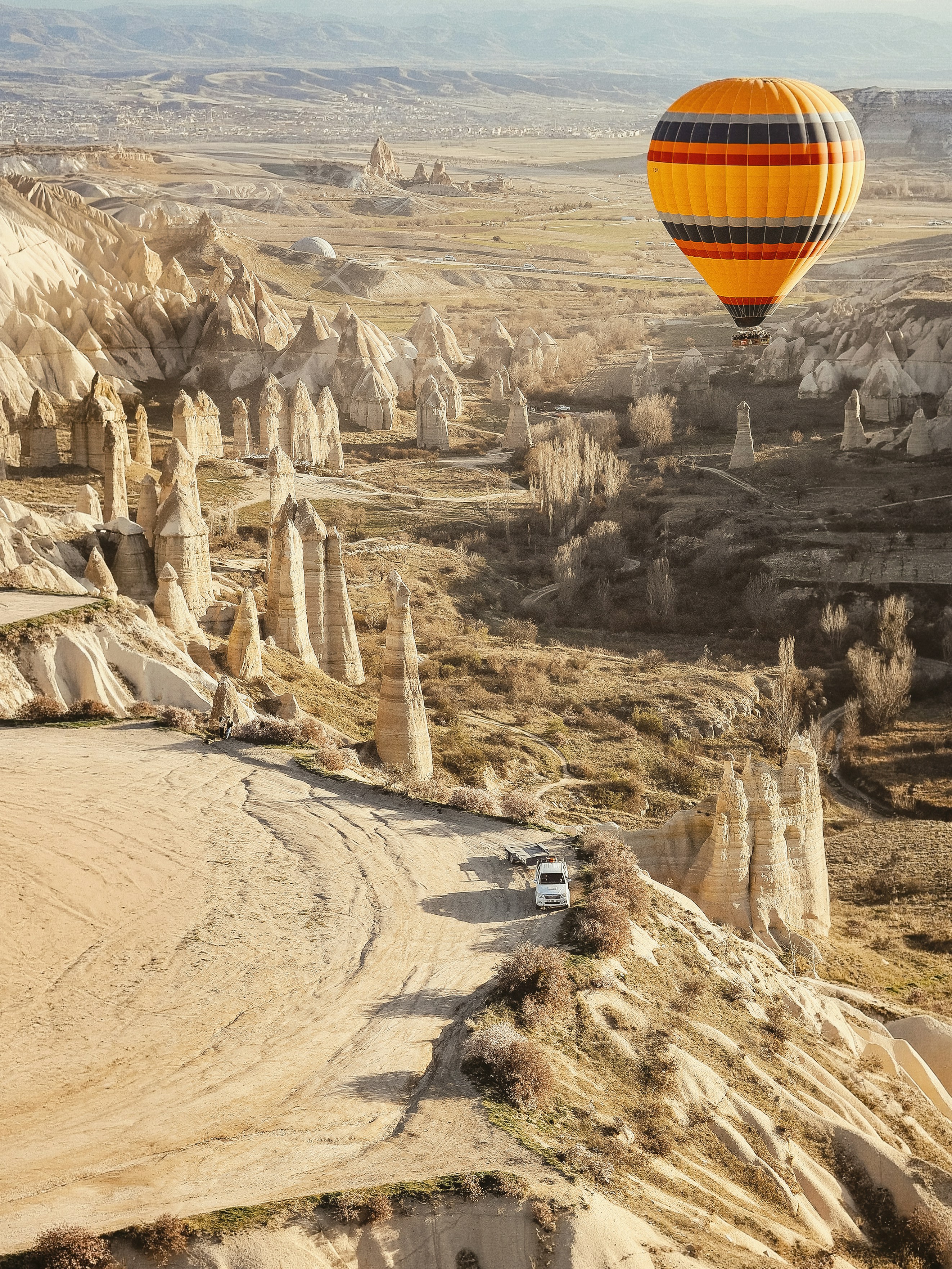 Floating Flame: A Balloon Over Painted Basins