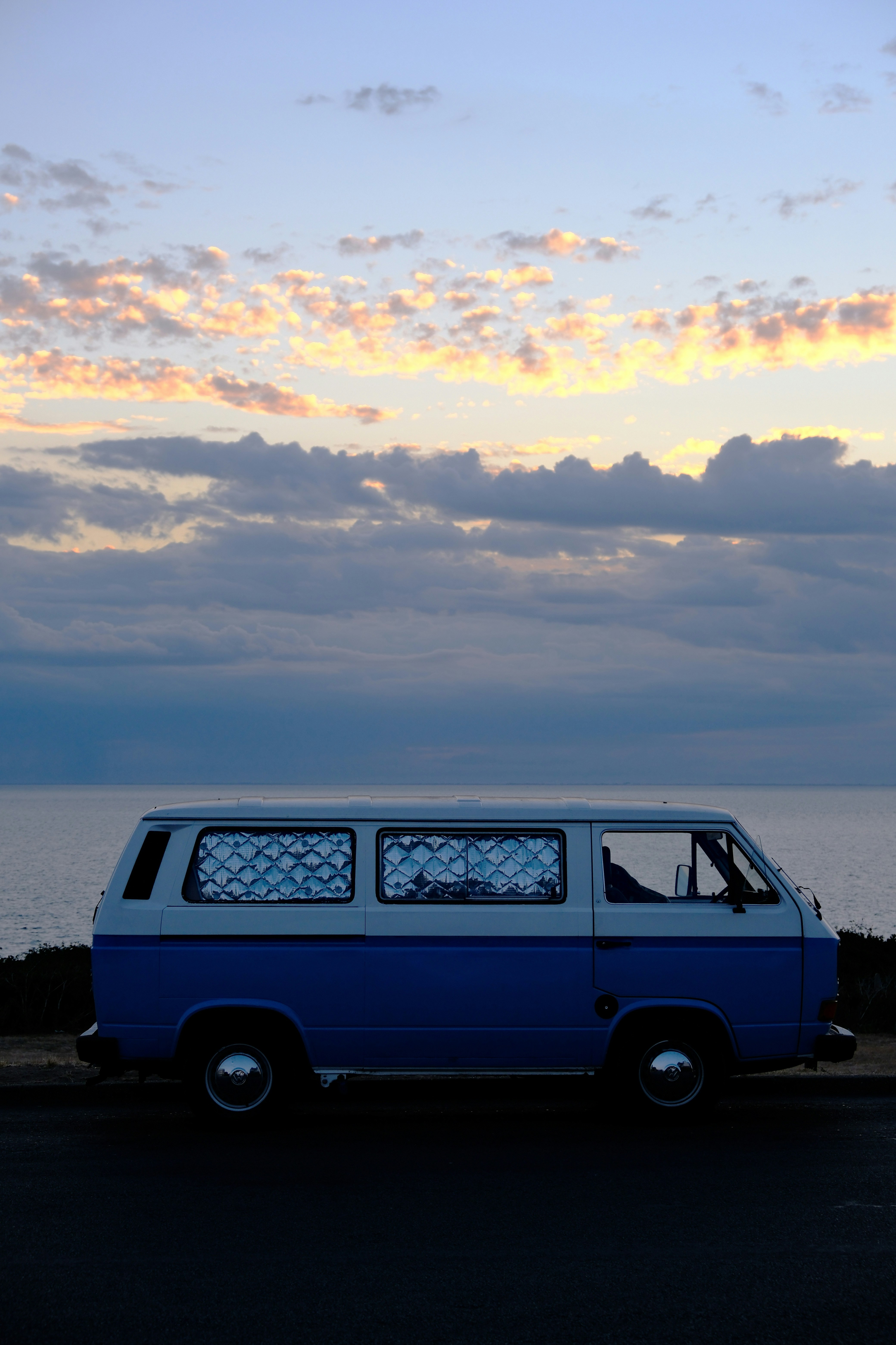 Blue Vanner at Dusk: A Quiet Seaside Roadside Portrait