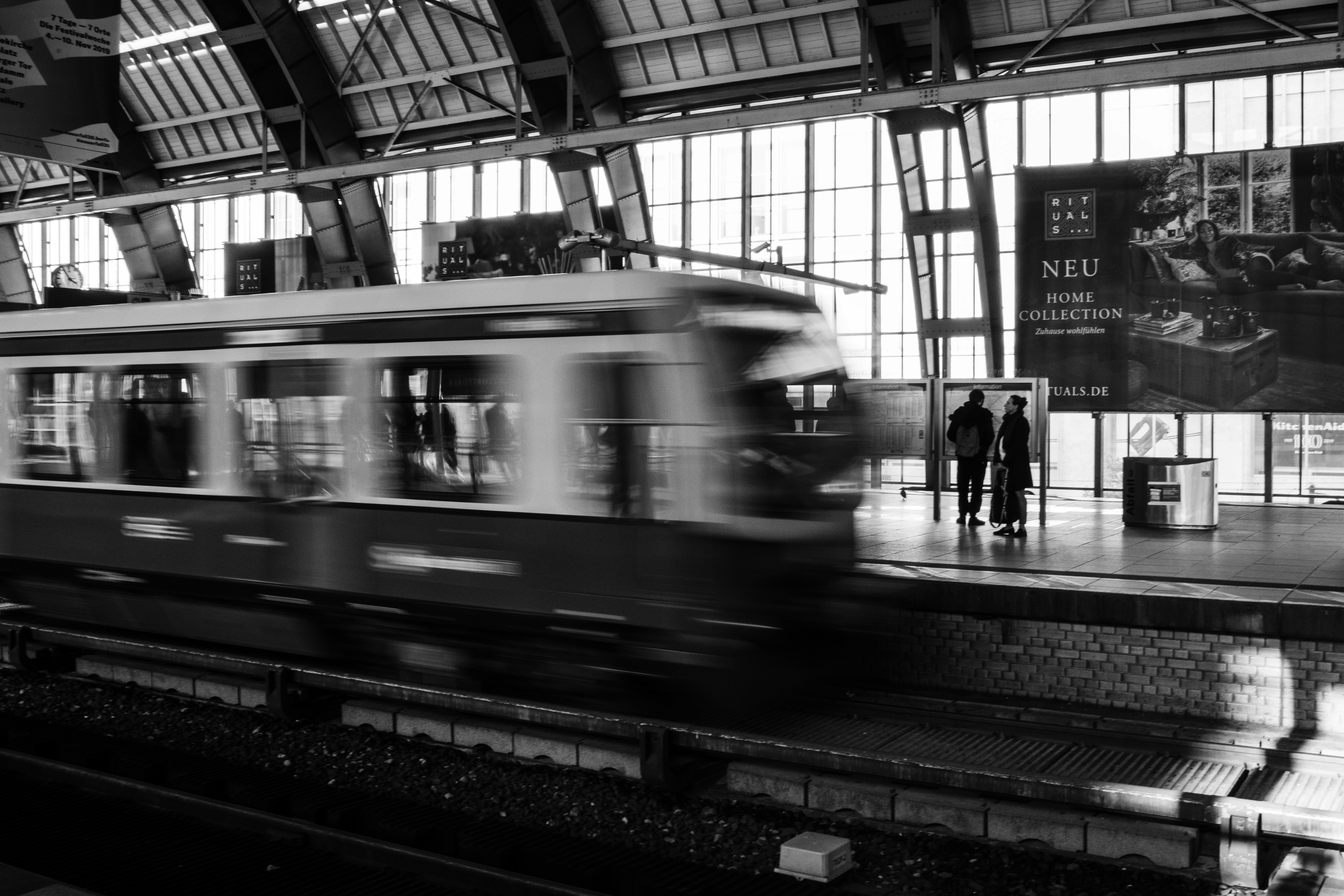 Motion at the Station: A Blurred Train in a Quiet Hall