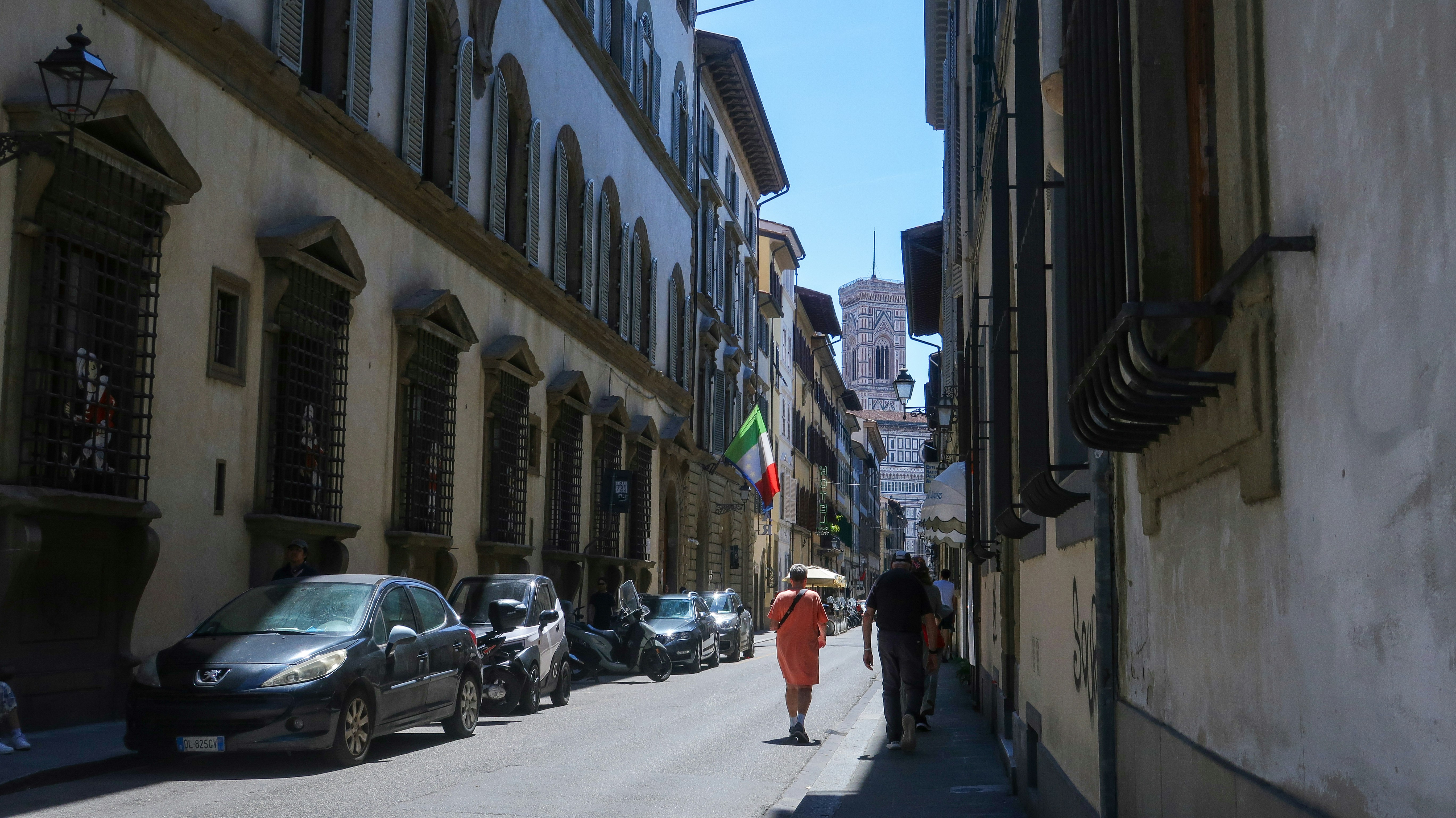 Italy by Streetlight: A Sunlit Walk Through a Narrow Tuscan Lane