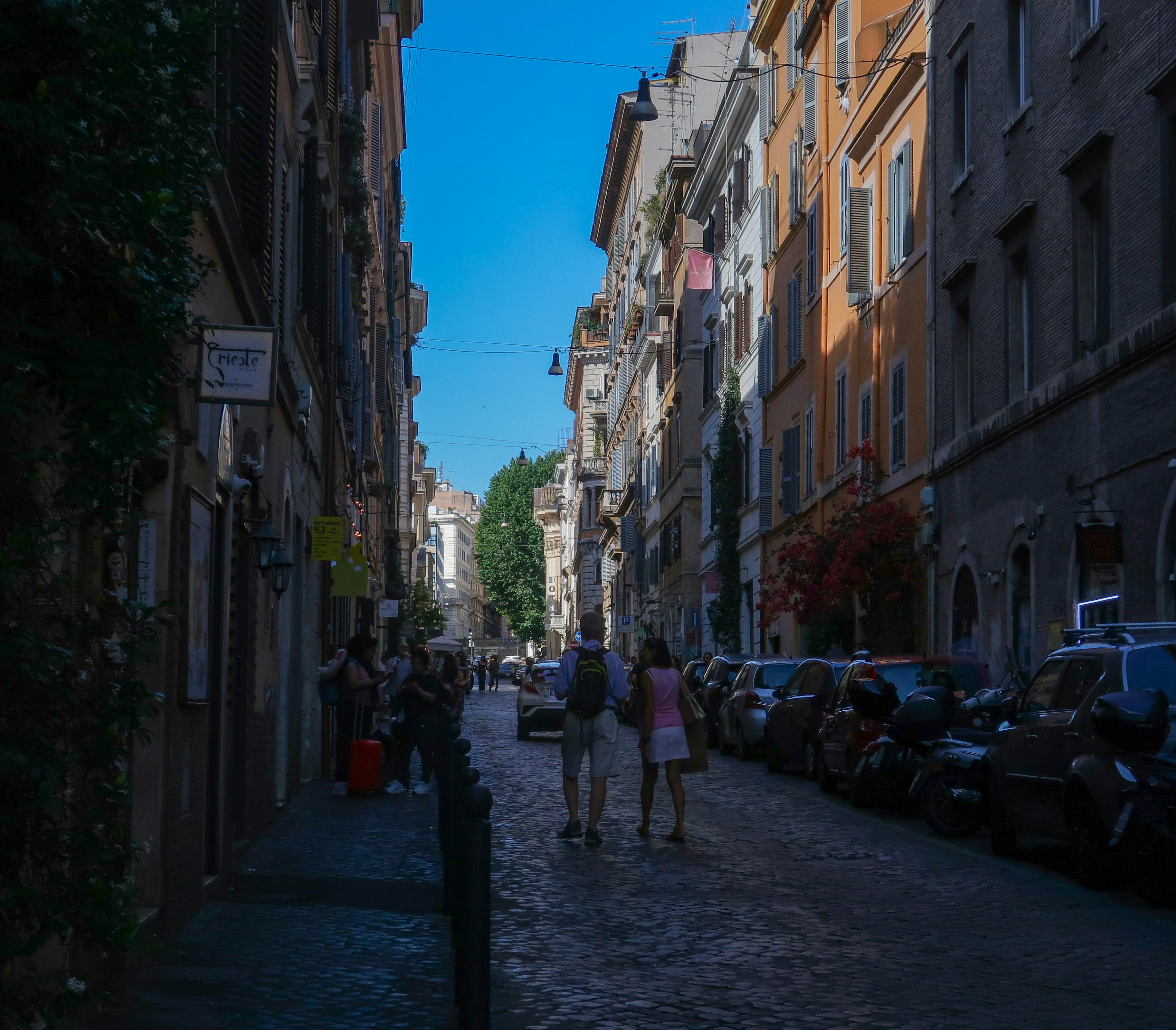 Sunlit Street in a Narrow Italian Corridor