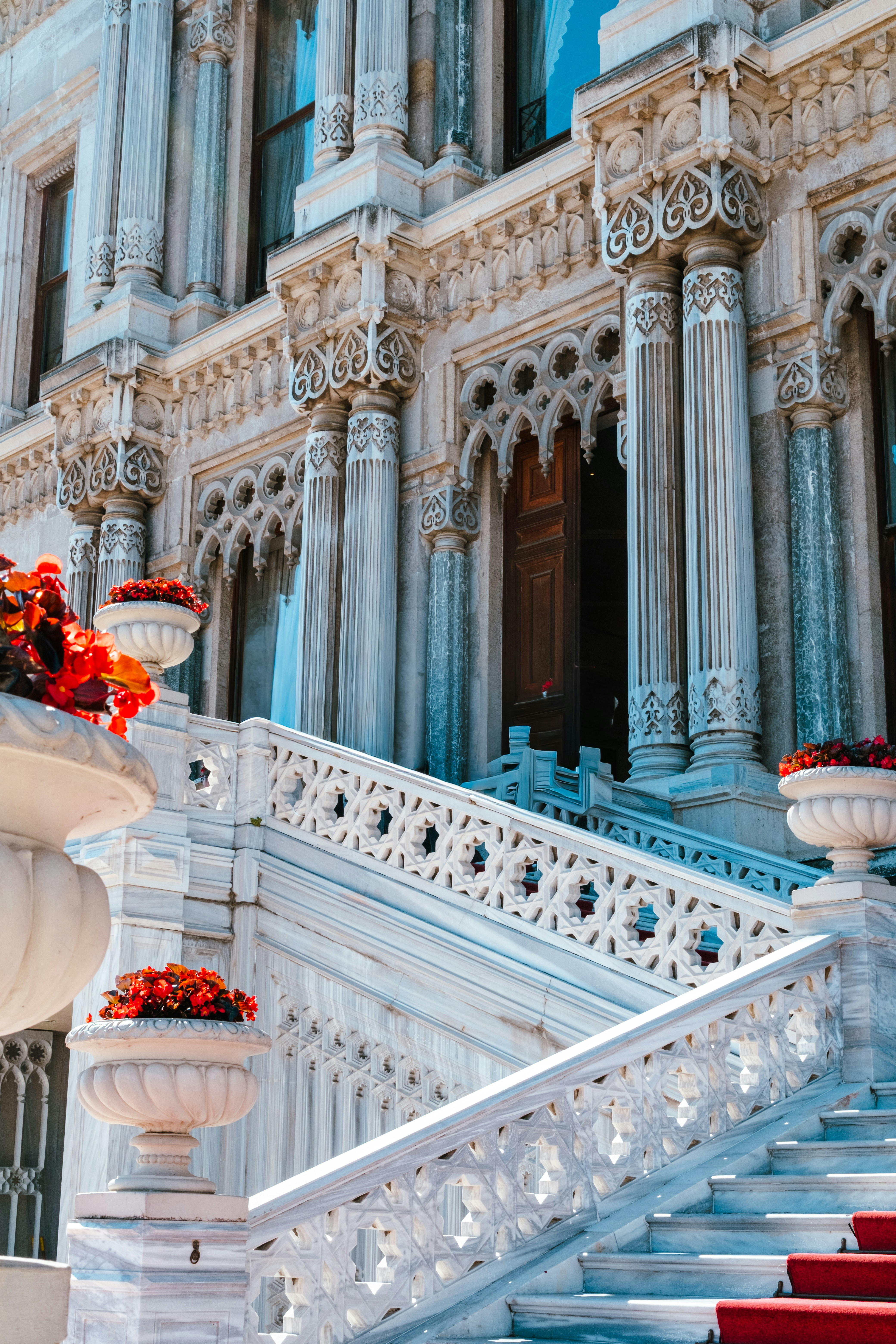 Ornate Marble Staircase Dwells Under Carved Façades