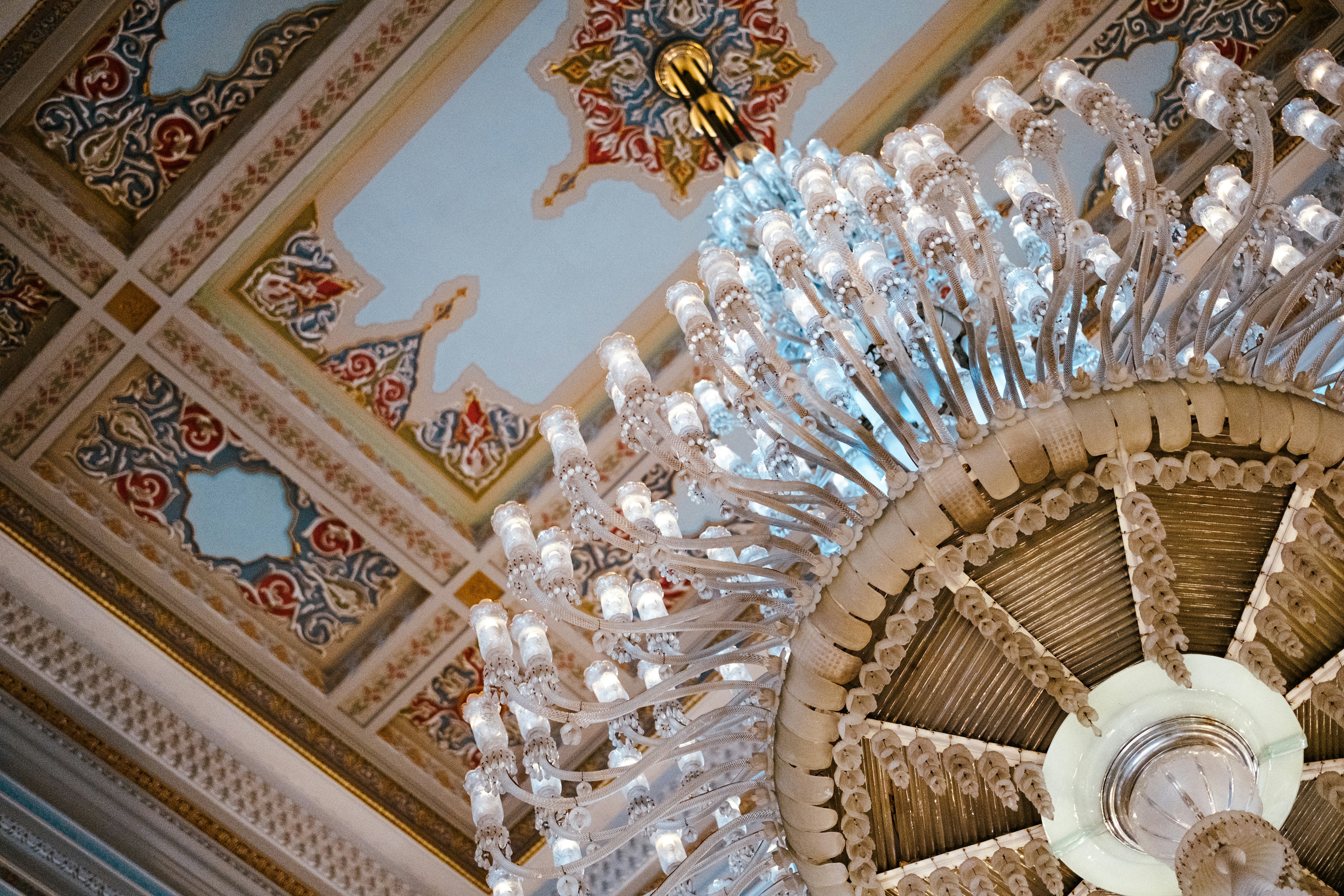 Chandelier Echoes: A Grand Ceiling and Orbed Luminescence