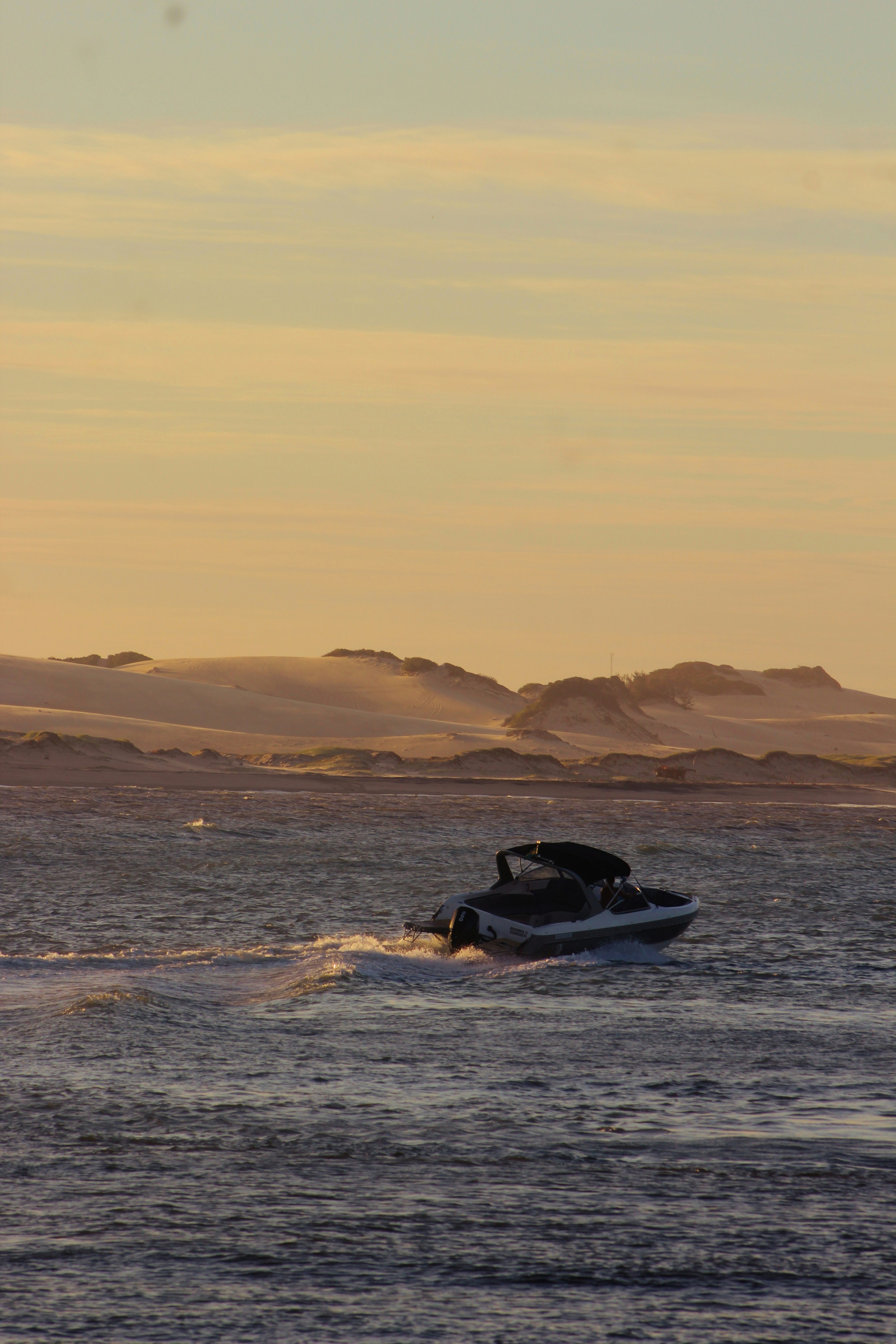 Jet Ski at Sunset over Dune Sea